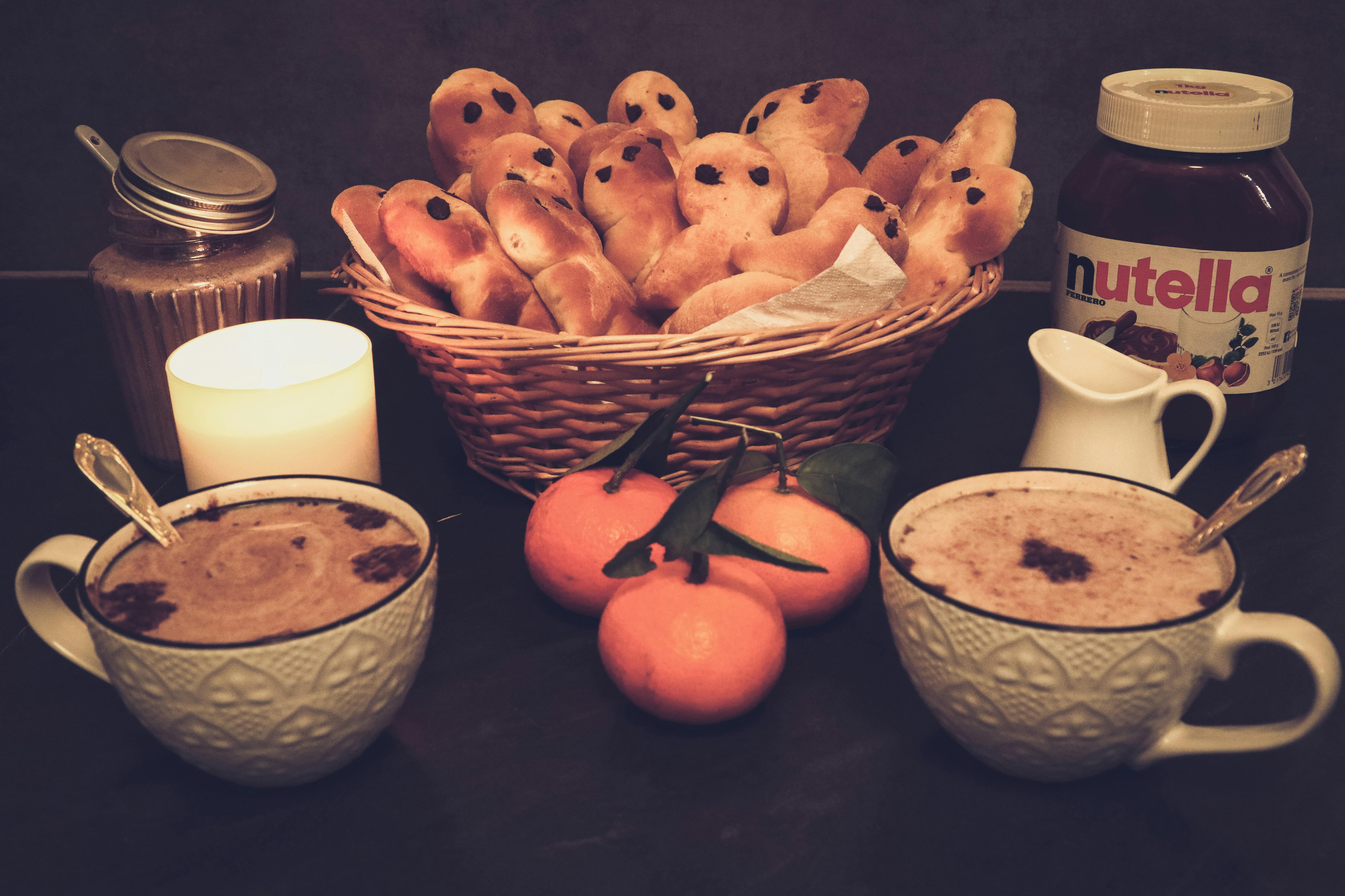 Sunlit Croissant Basket Framed by Nutella and Cocoa