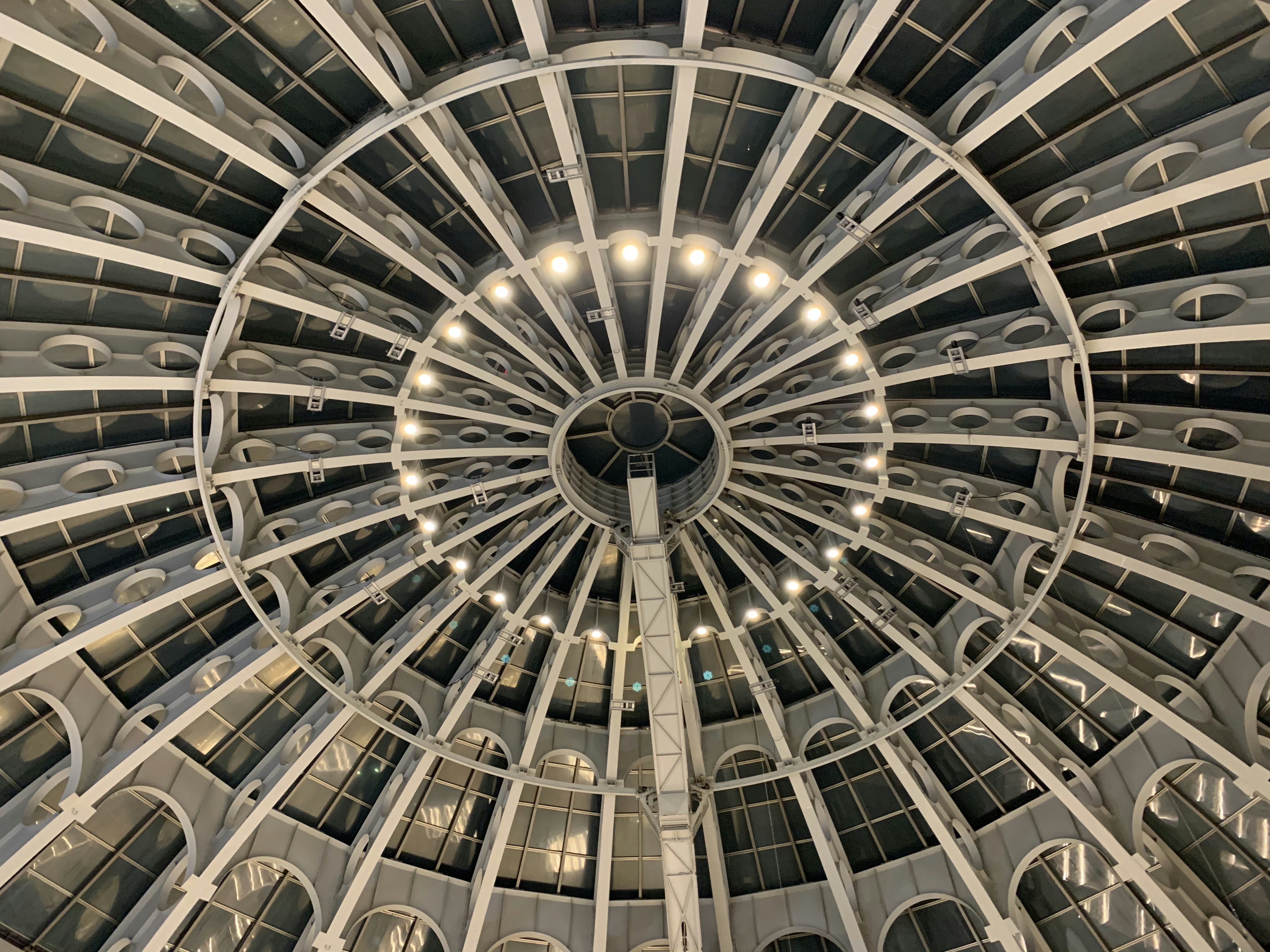 Radiant Rings: The Circular Steel Dome Illuminated from Within