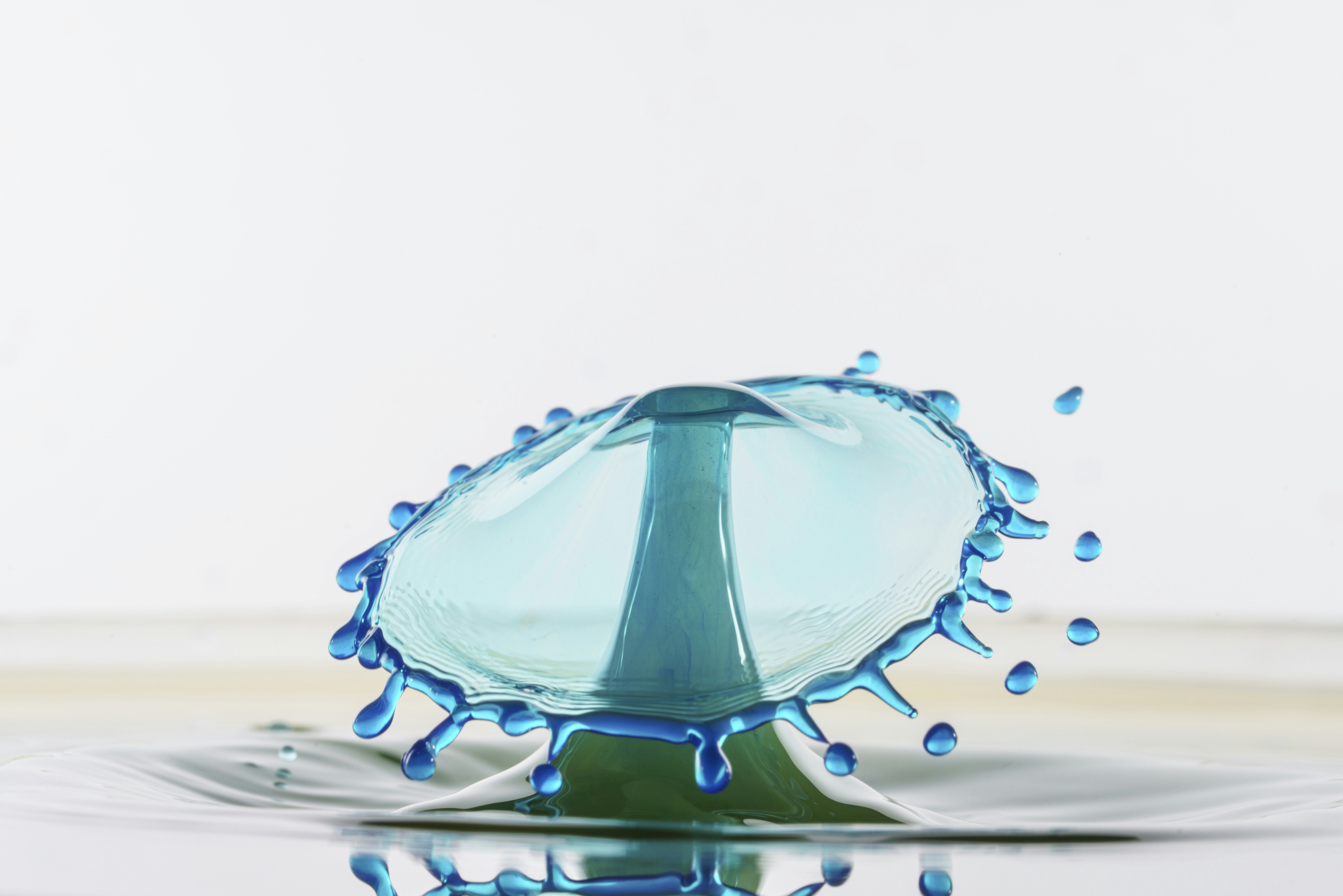 Cerulean Crown: A Frozen Moment of Blue Water Collision