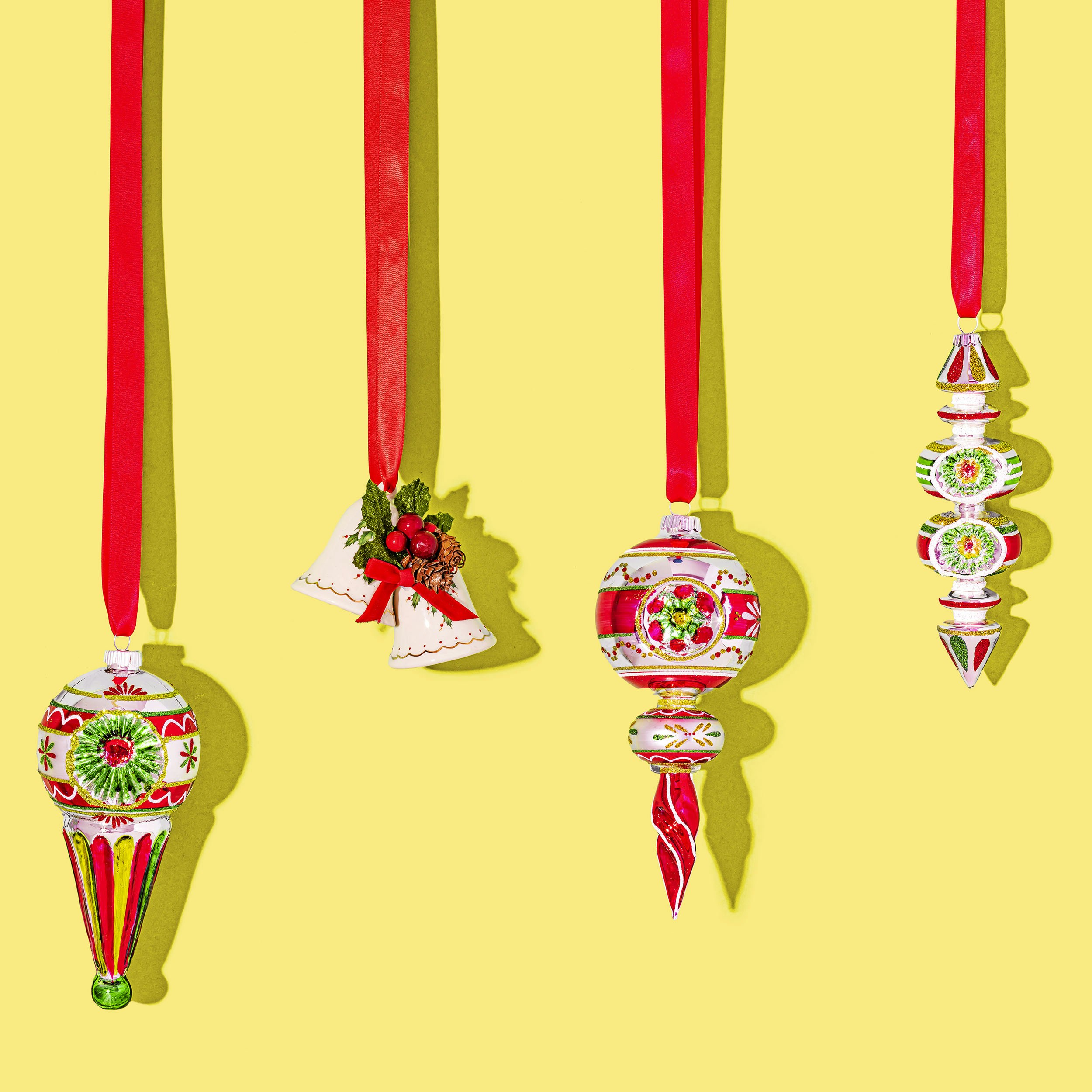 Crimson Charms Dangling Against a Lemon Yellow Backdrop