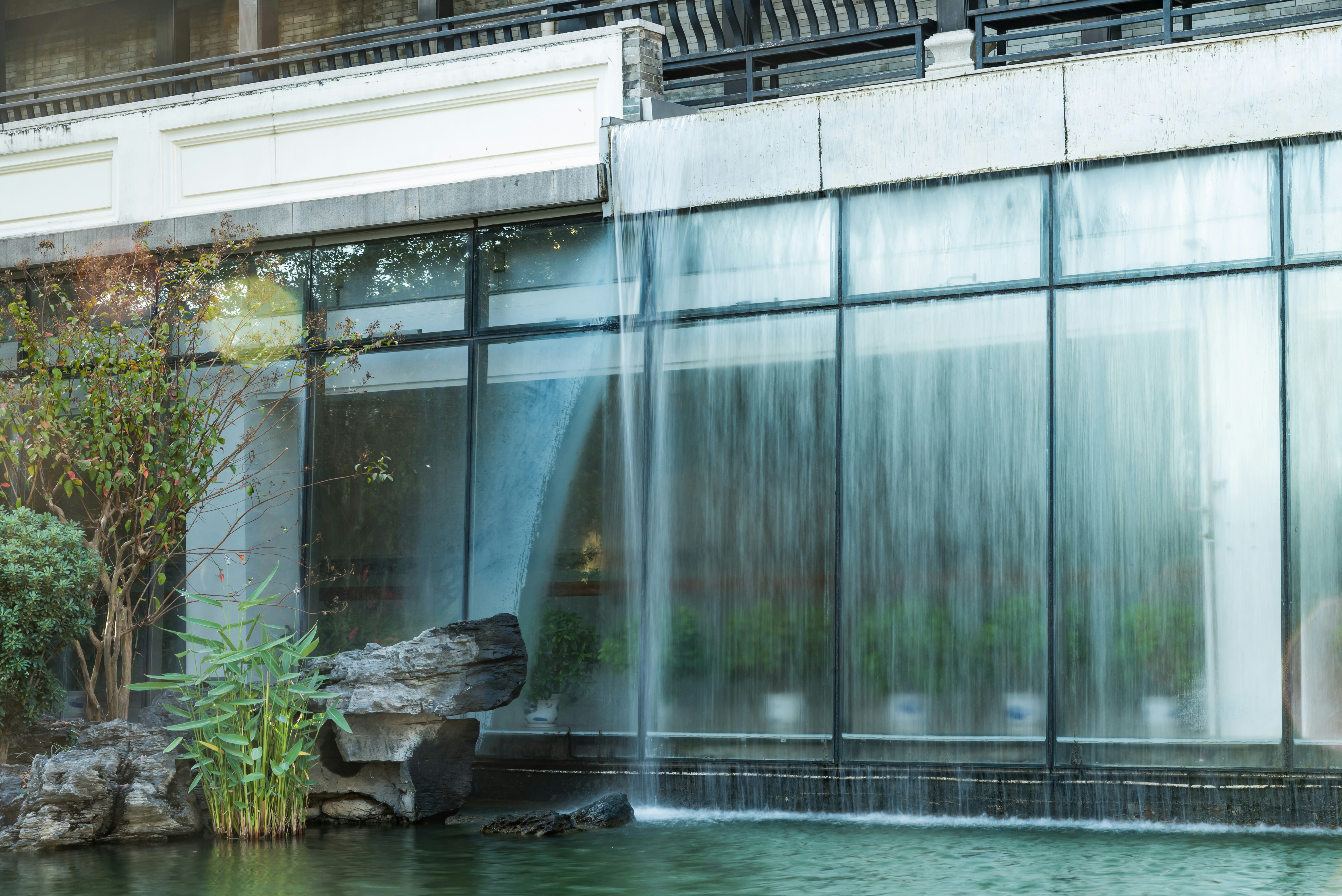 Glass Curtain Cascade by the Water Feature