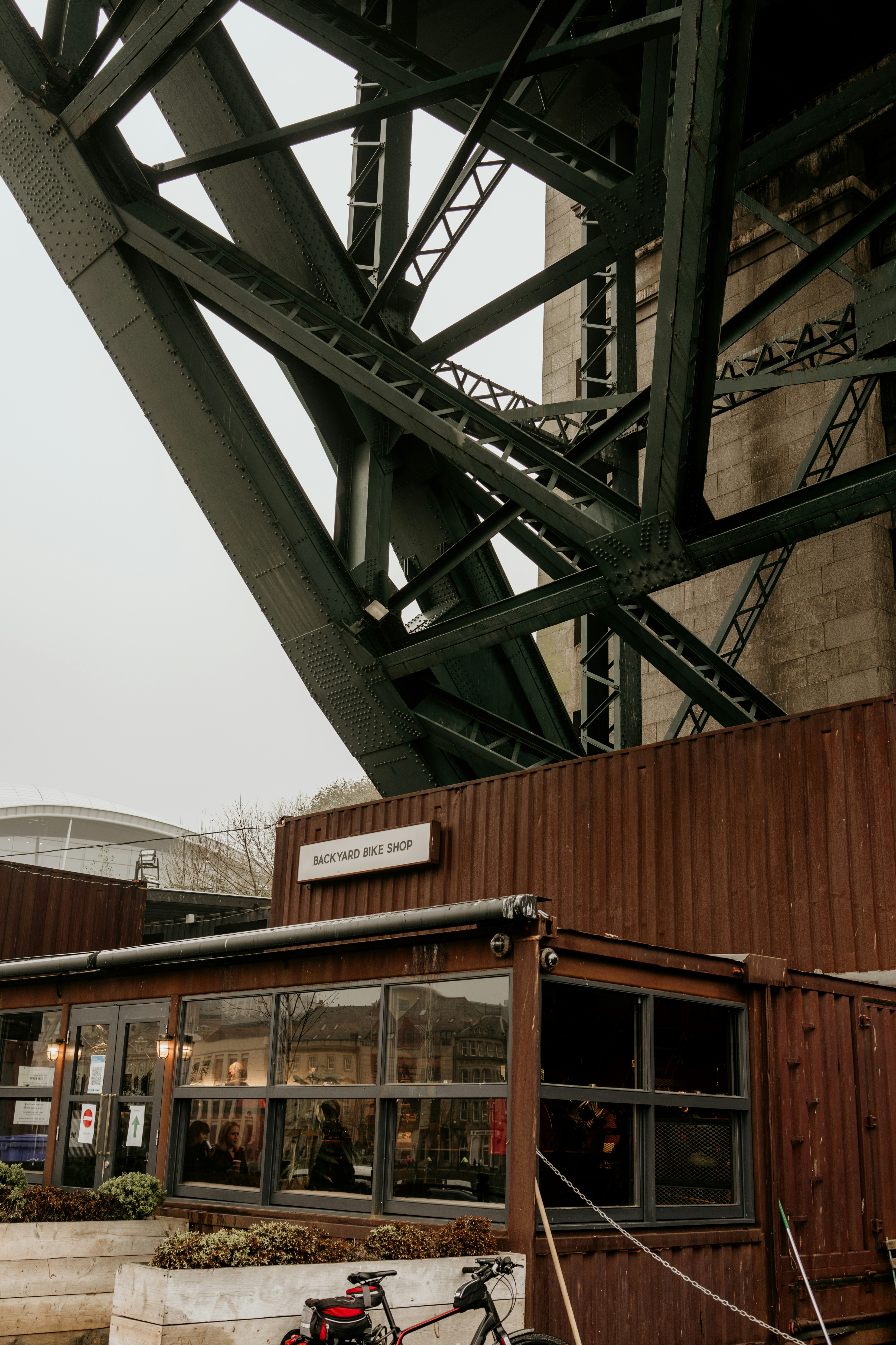 Under the Bridge, Backyard Bike Shop: A Quiet Urban Nook