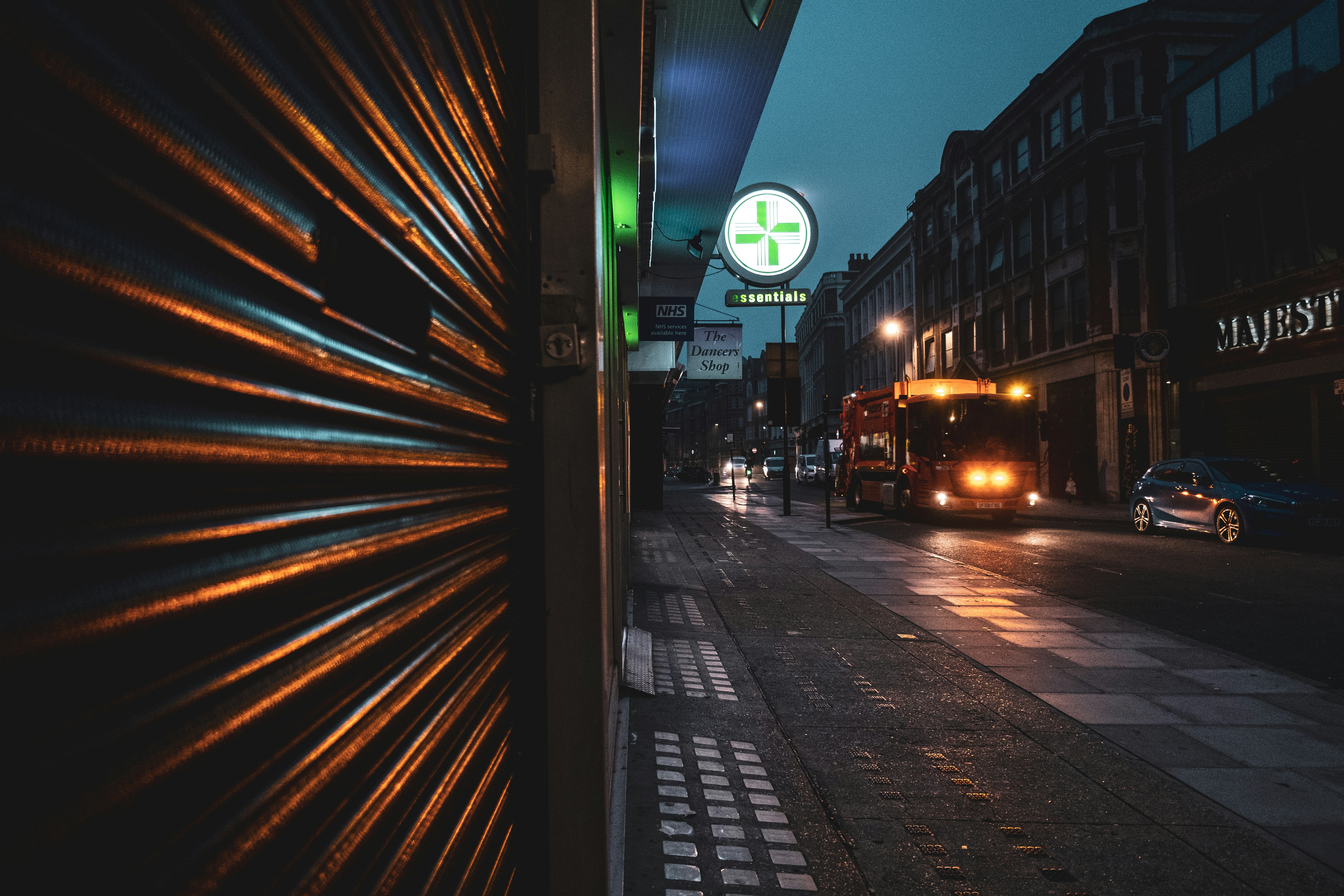 Neon Night on a Pavement: A Quiet Street Awakens