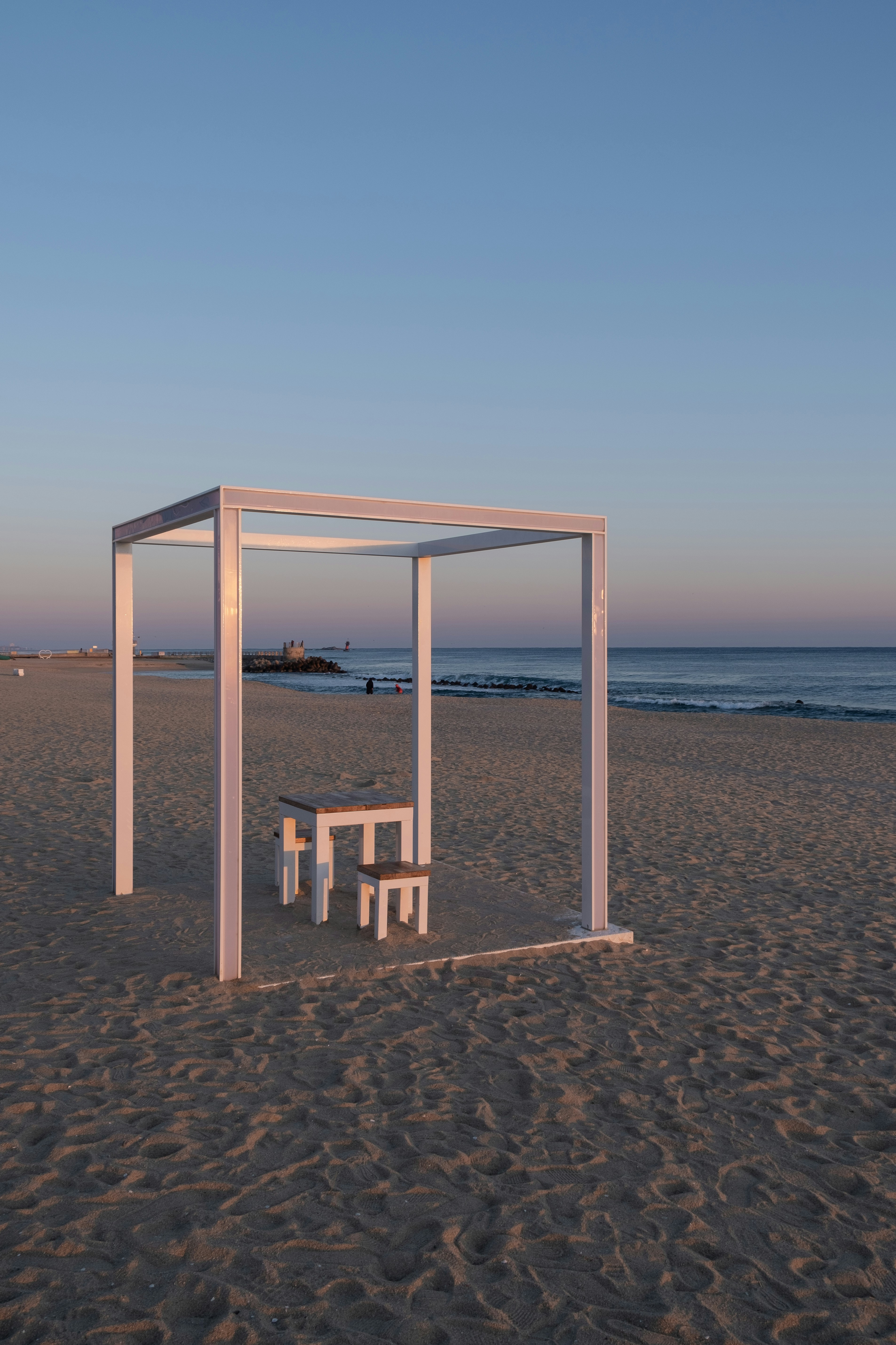 Geometric Beach Frame Under a Gradient Sunset