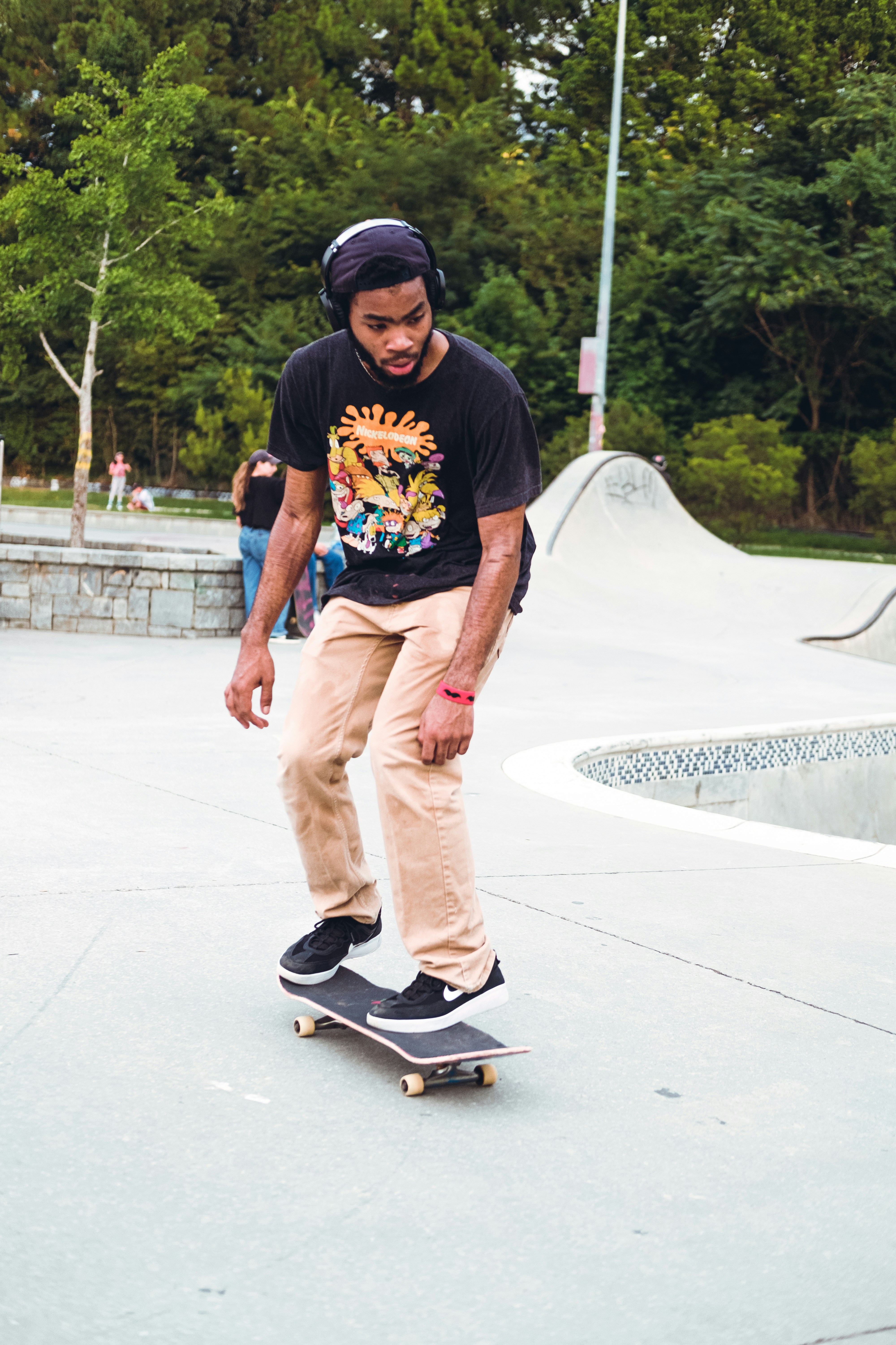 Whisper of Wheels: Skater Finds Balance in a Park Bowl