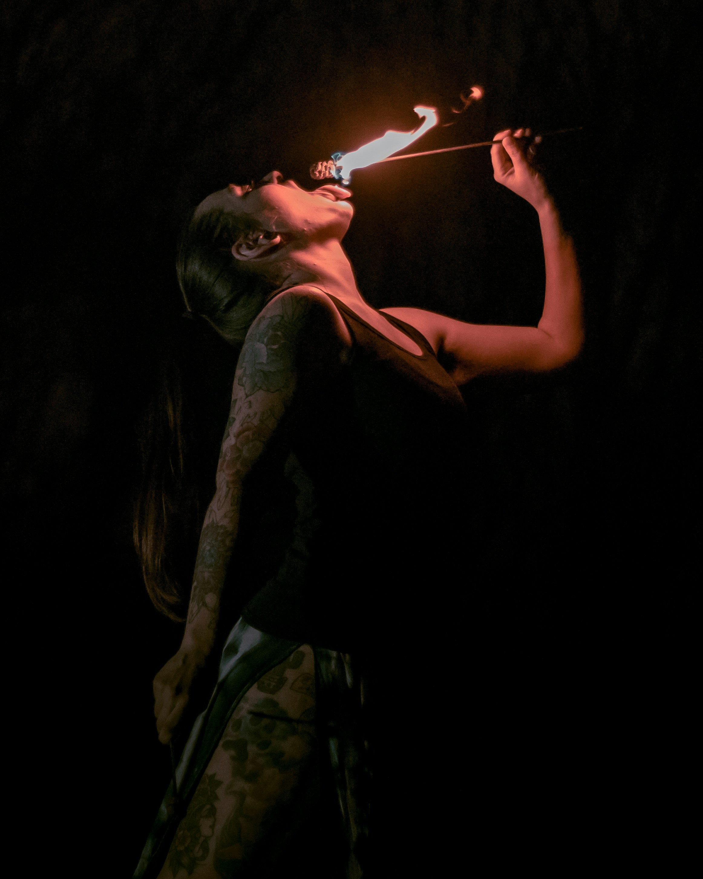 Nightfire in Velvet Shadow: Torch-Breath Performance