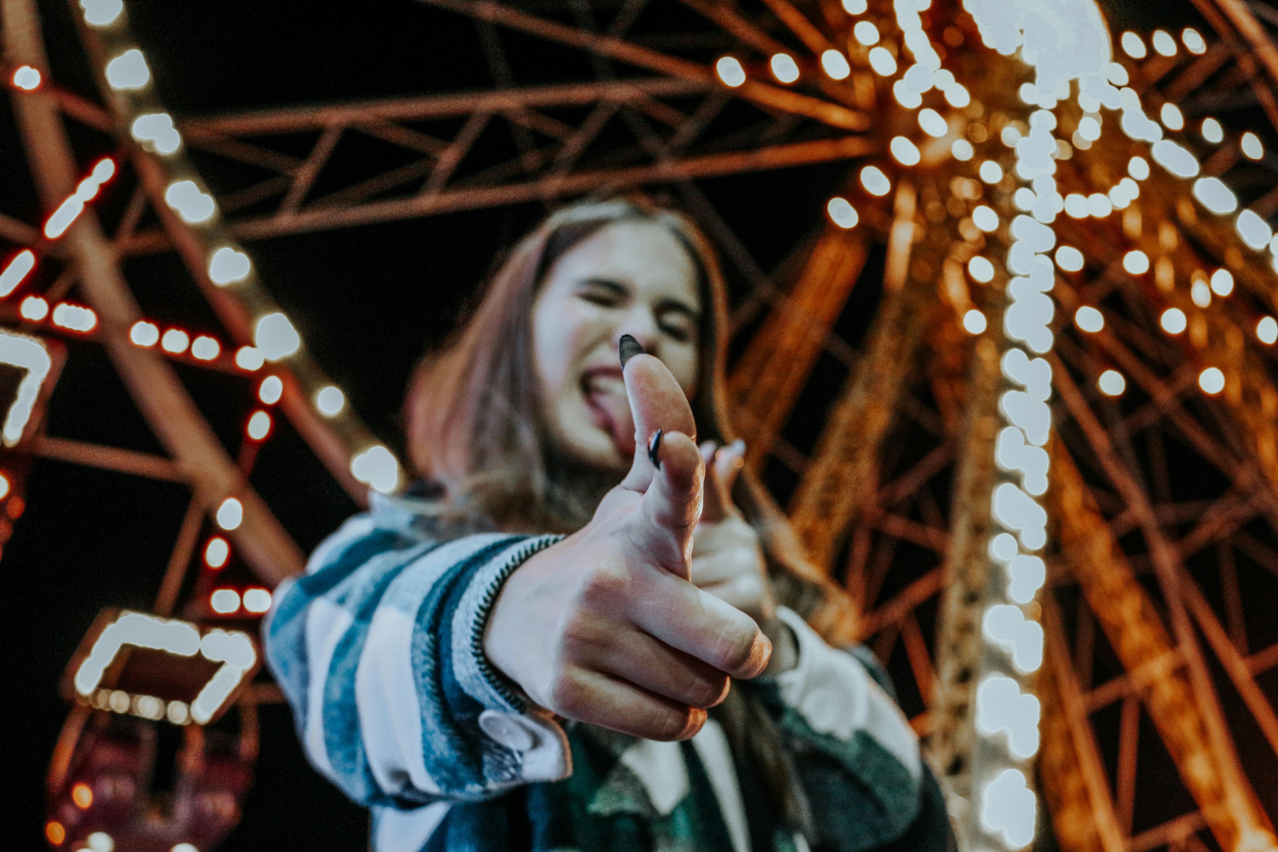 Finger Forward, Neon Ferris Wheel: A Carnival Moment