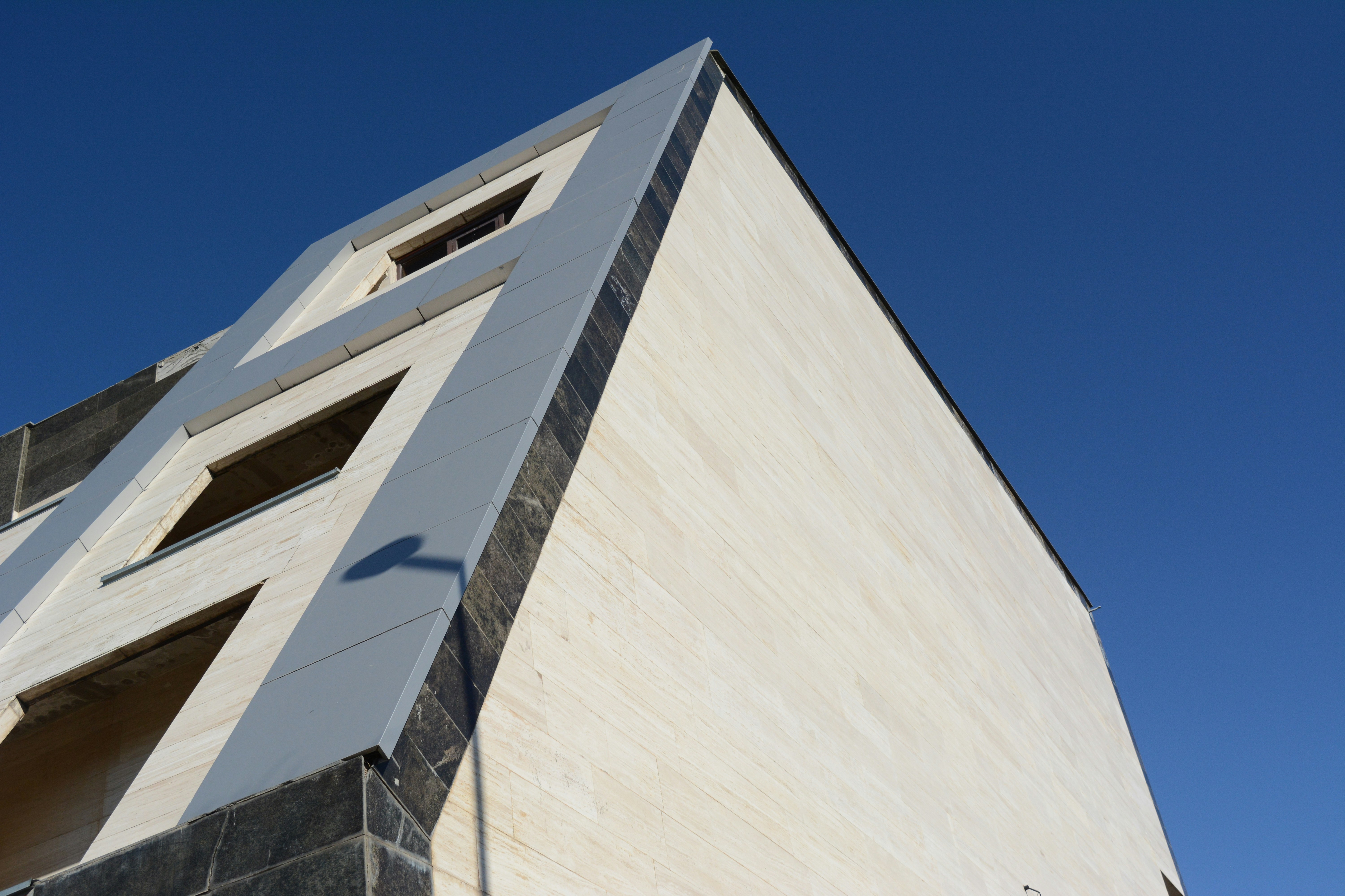 White concrete building under blue sky during daytime photo – Free ...