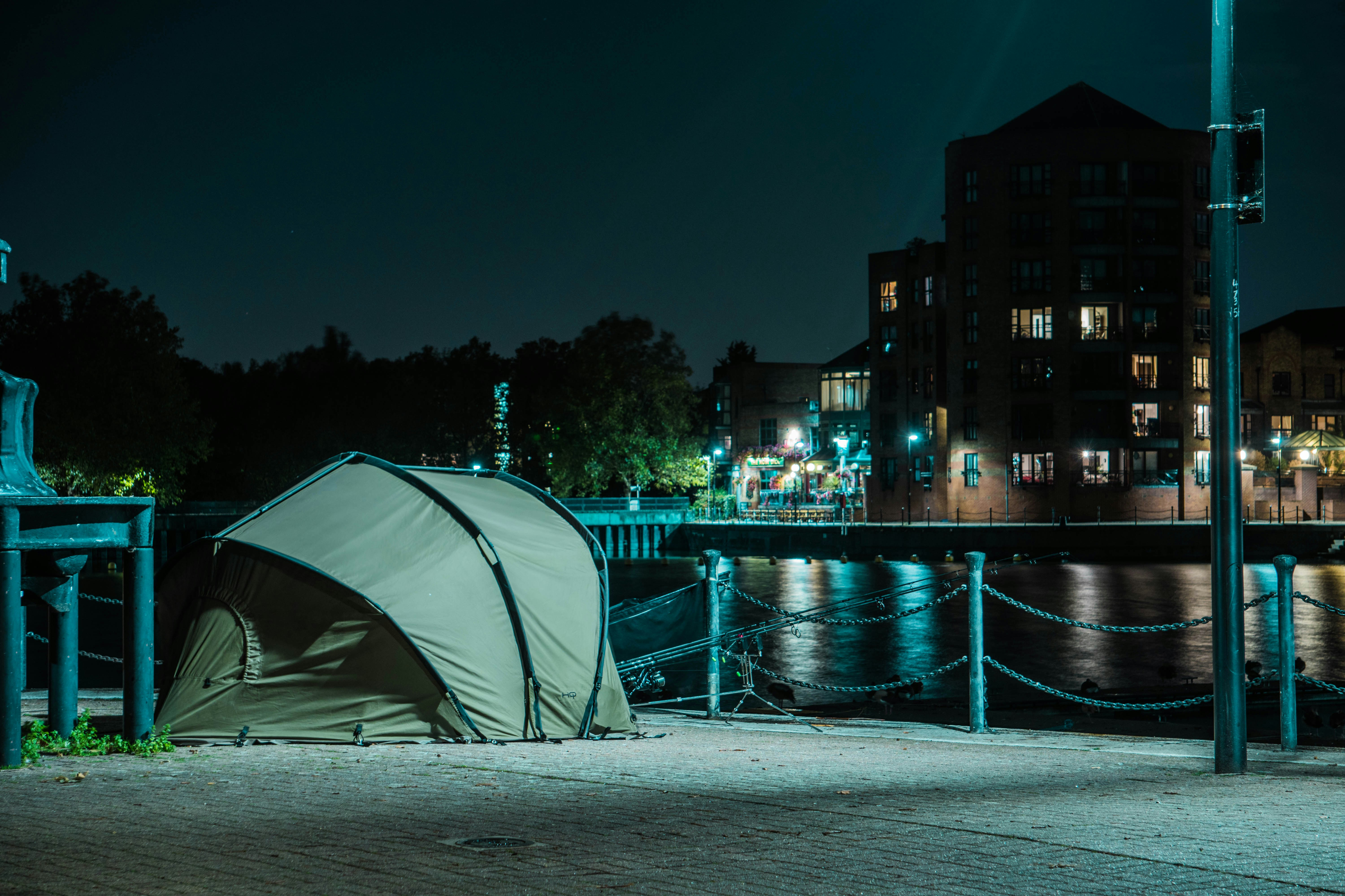Teal Night Camp at the Quayside: Tent Under Harbor Lights