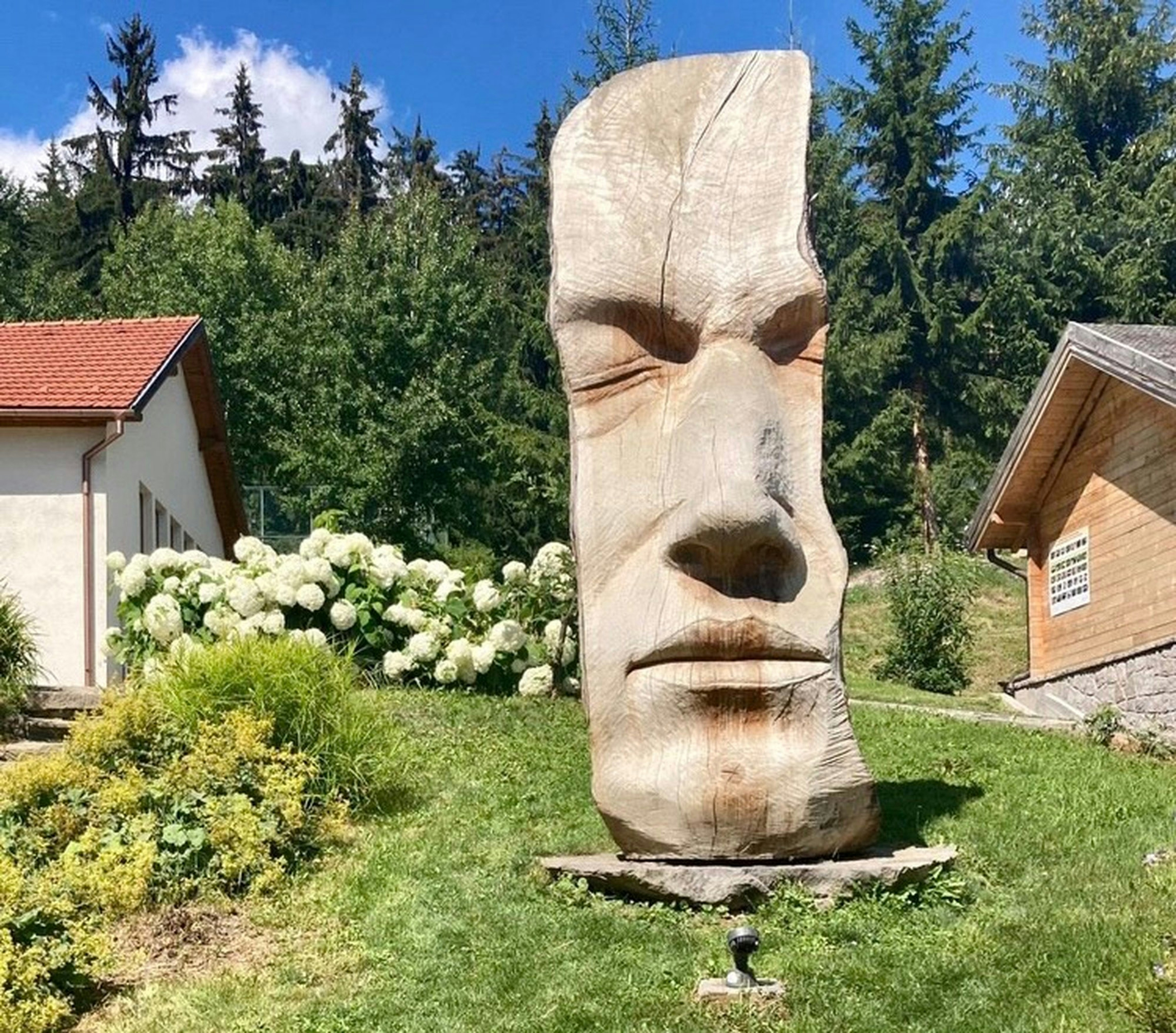 Brown concrete statue on green grass field during daytime photo – Free ...