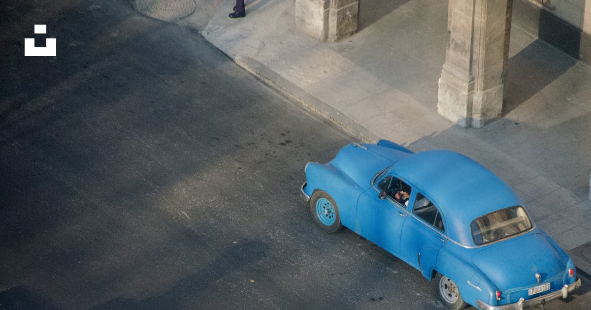 Blue Beetle Car Parked On Gray Concrete Floor Photo Free Car On The