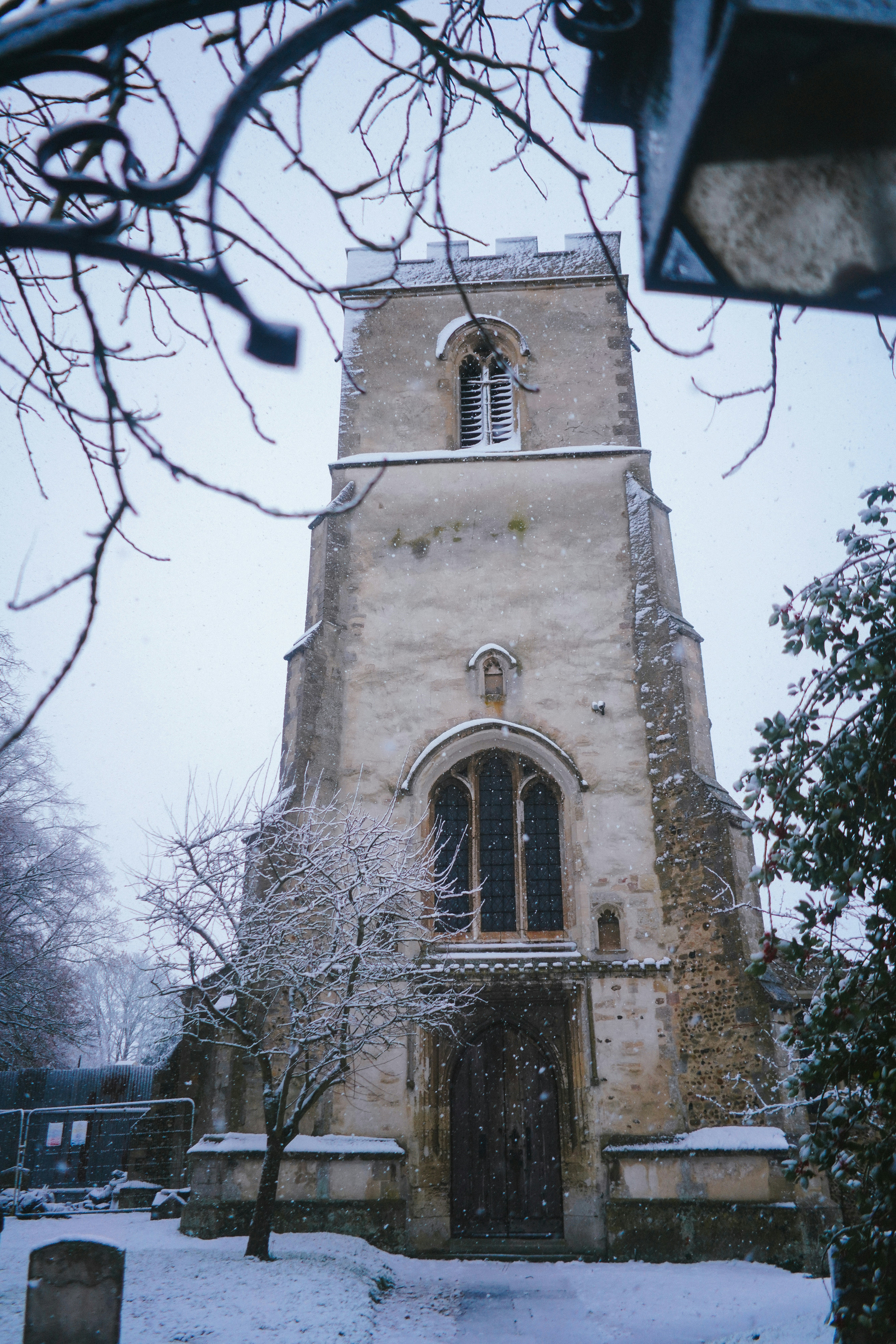 Snowbound Bell Tower: Winter Silence Clinging to Stone
