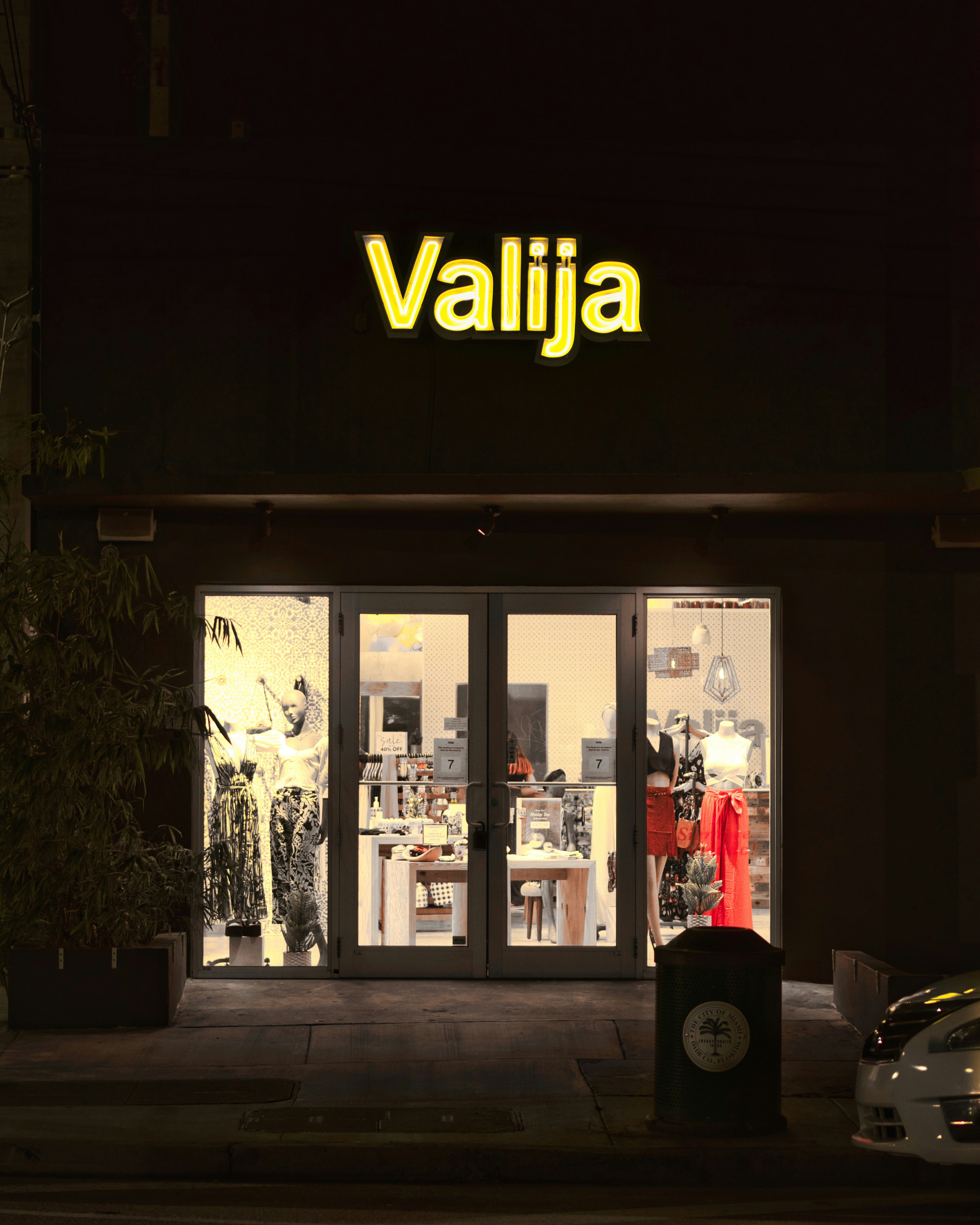 A store front at night with the lights on photo – Free Miami Image on ...