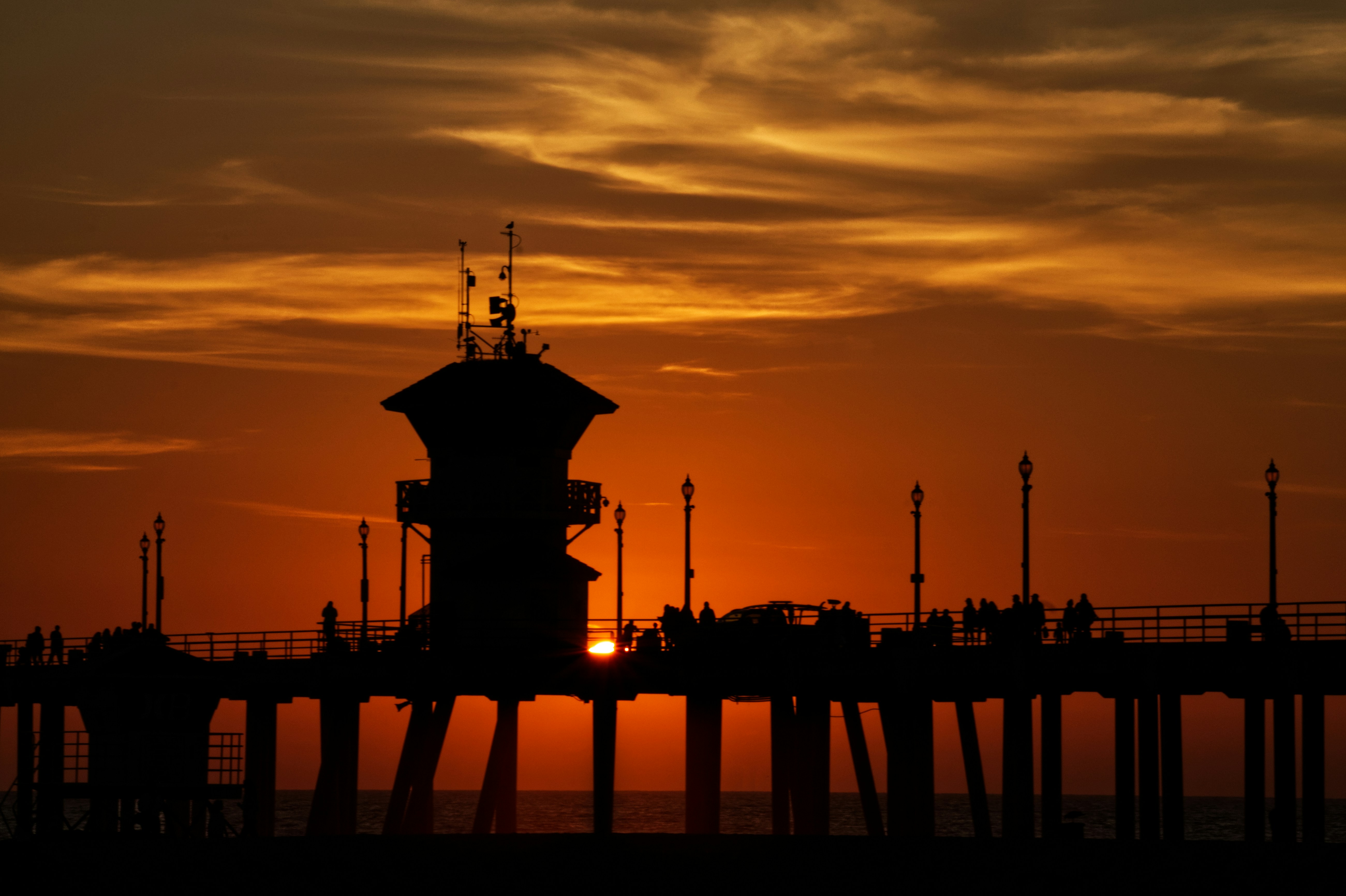 Beautiful Sunset on the pier of HB in California. High quality. 
