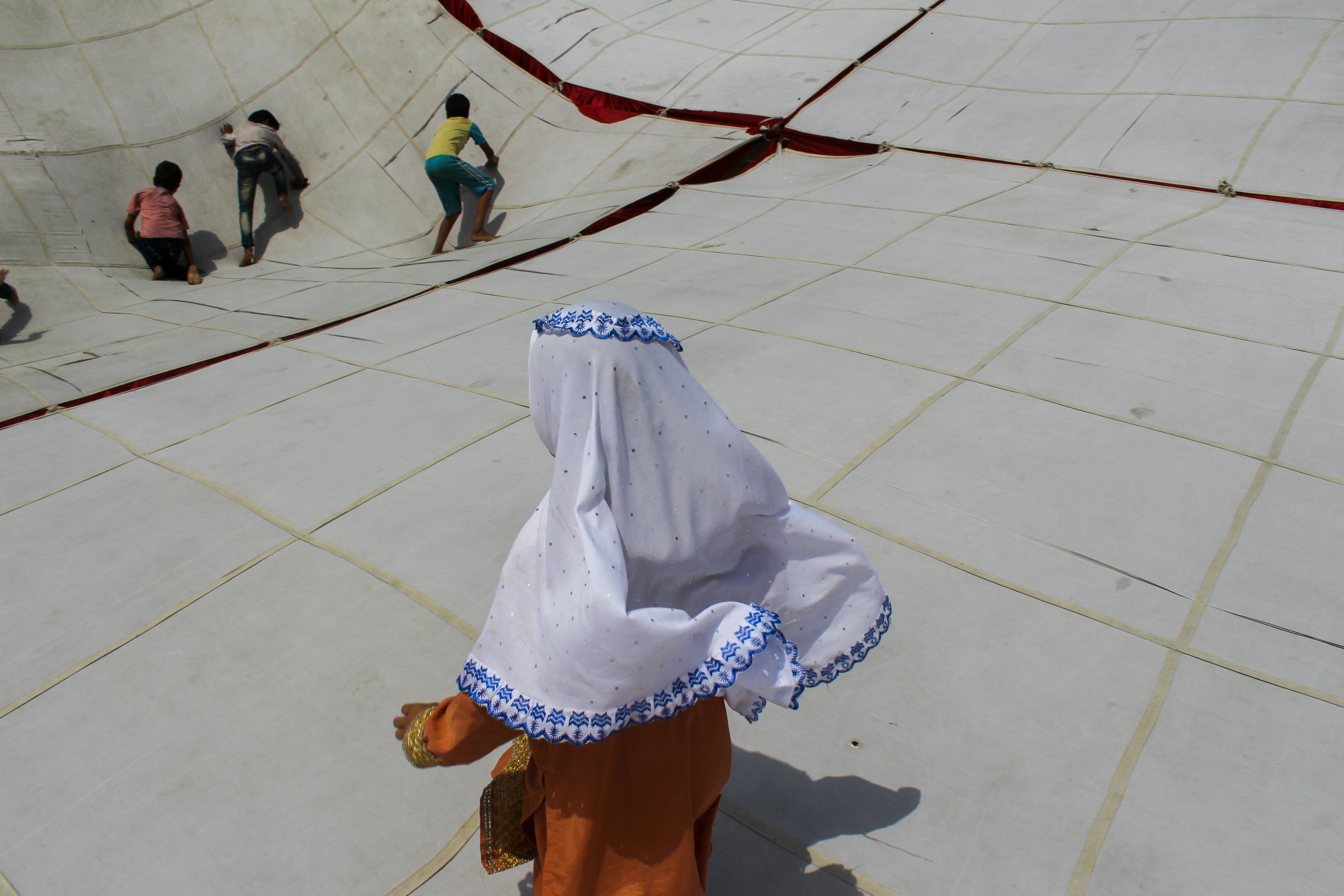 The Veiled Dancer Over a Sunlit Bowl