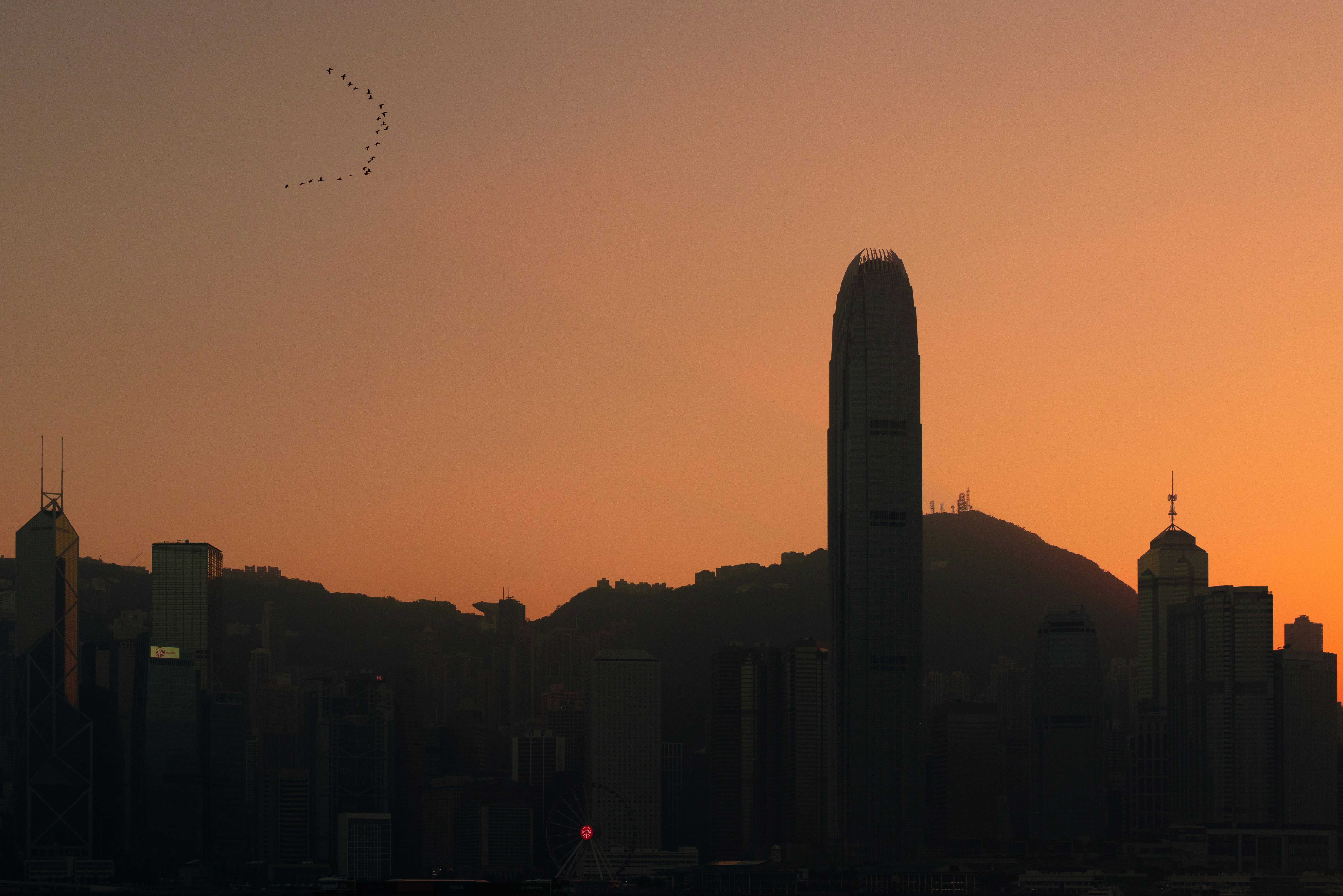 Ember Skyline: The Central Tower Standing Against a Copper Sunset
