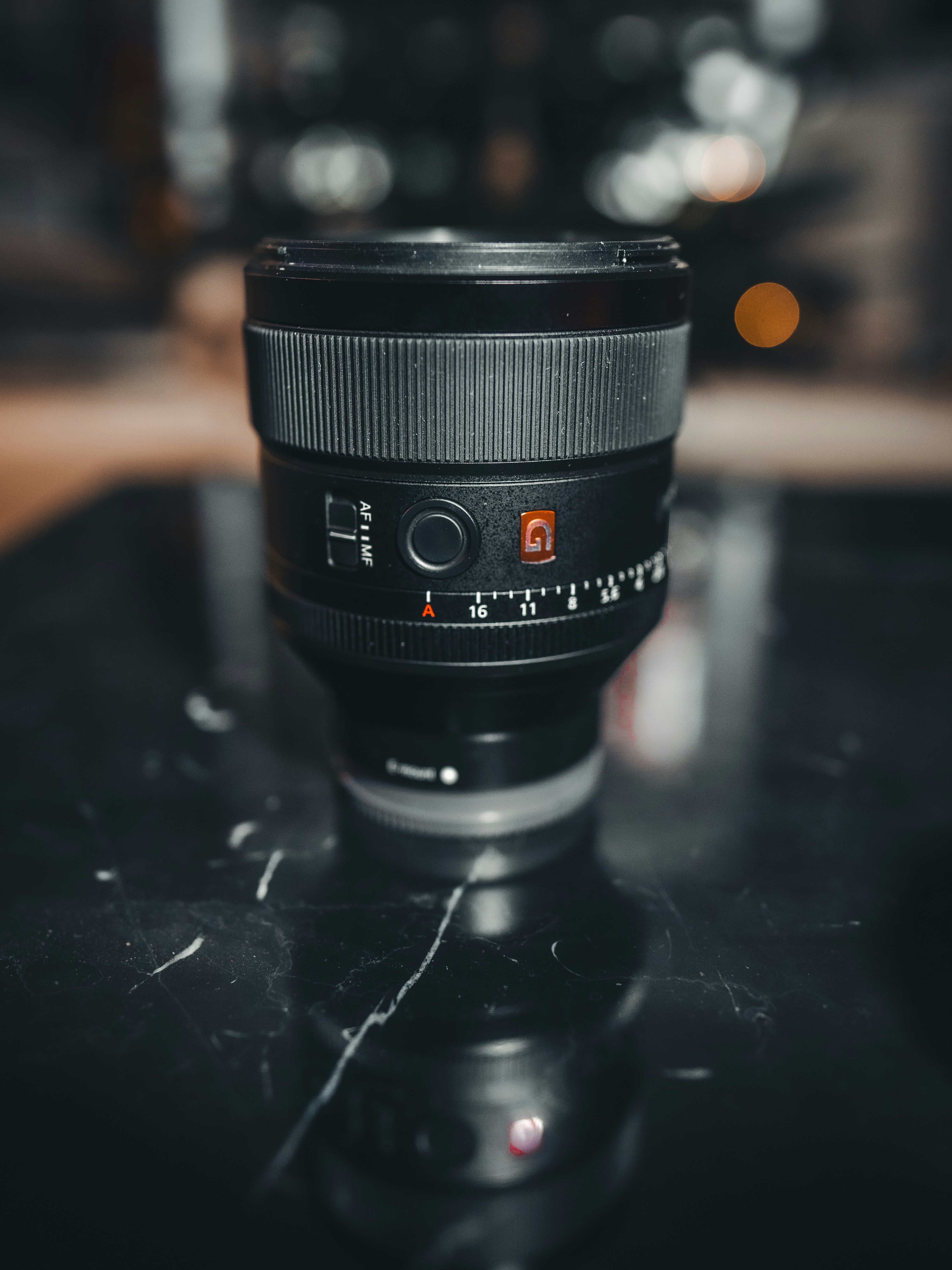 Black camera lens on black table photo – Free Grey Image on Unsplash