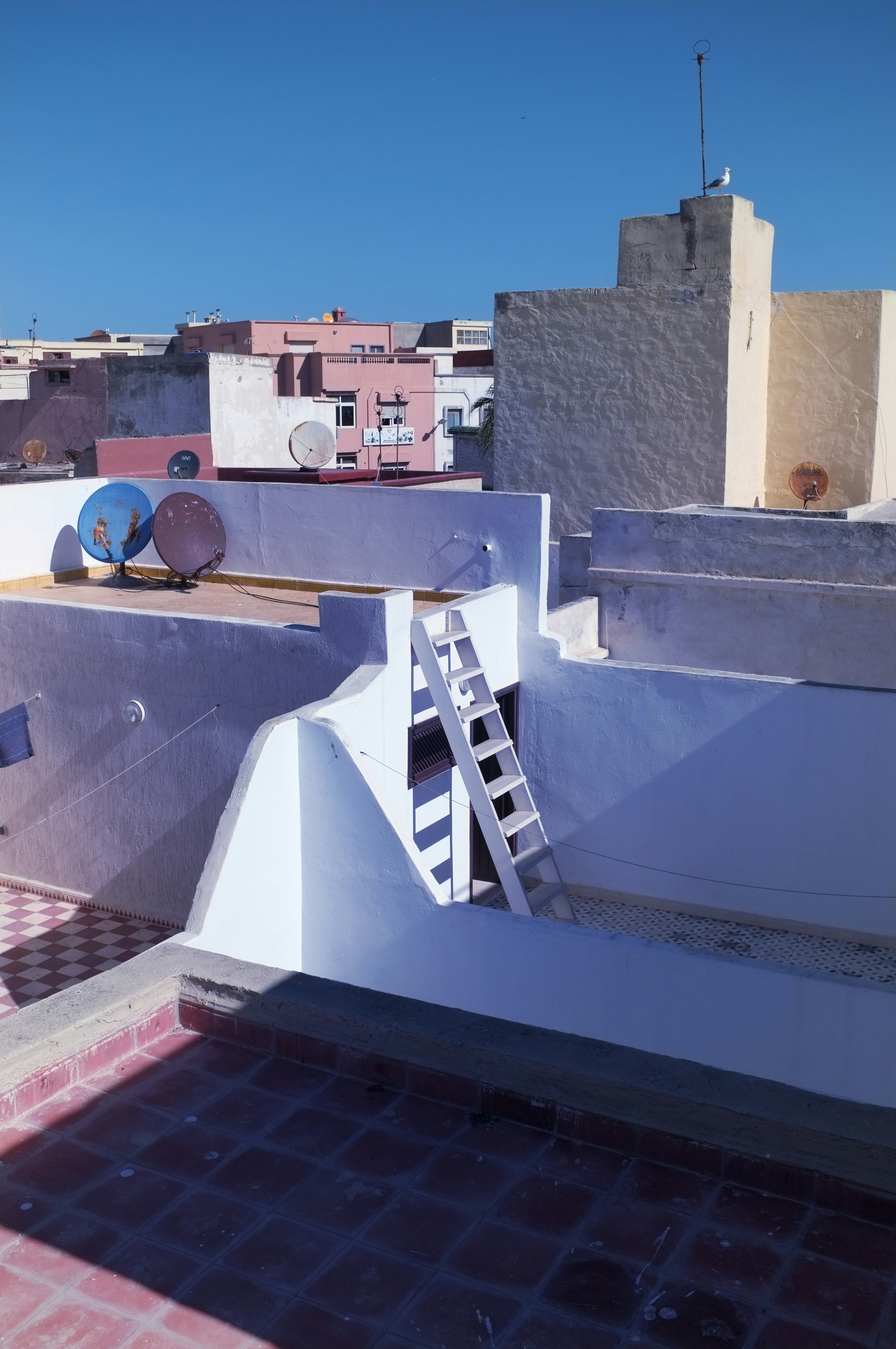 Urban Rooftop Mosaic: A Study in Geometry and ColorMayeur Pascal