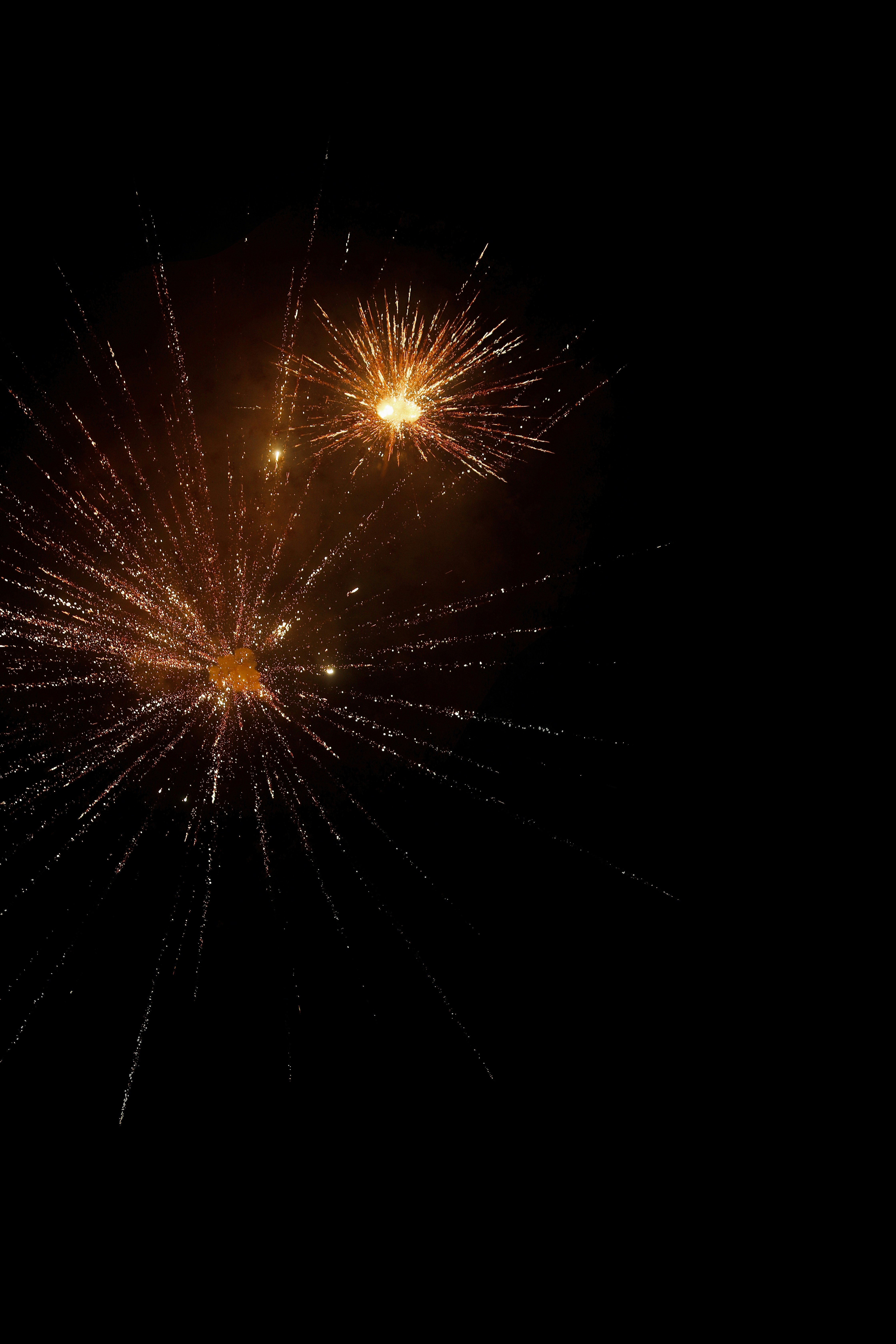 Orange fireworks in the sky during night time photo – Free Brown Image ...