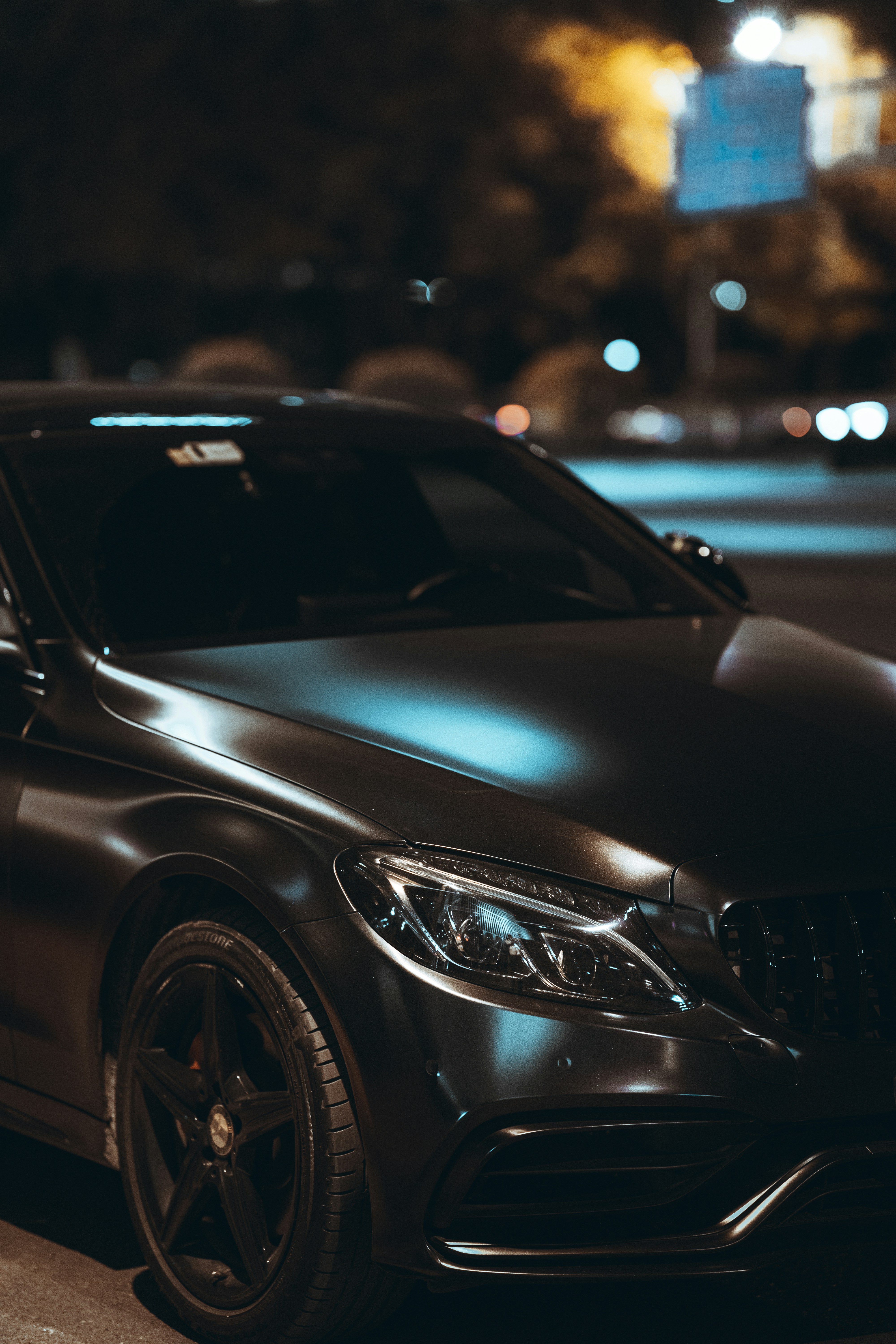 black mercedes benz c class on road during night time