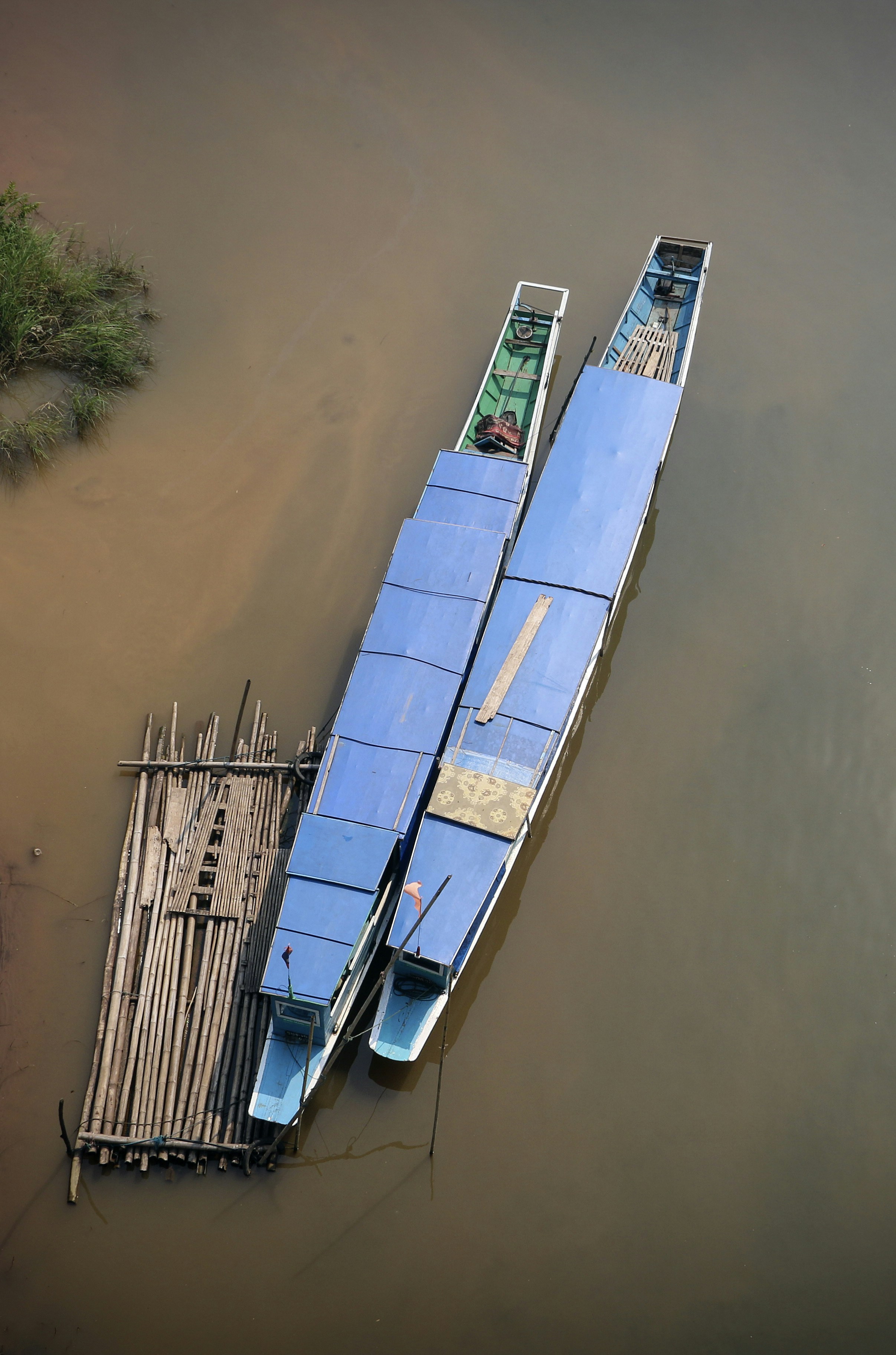 Blue Barges Aligning on a Murky River: An Aerial Study of Parallel Vessels