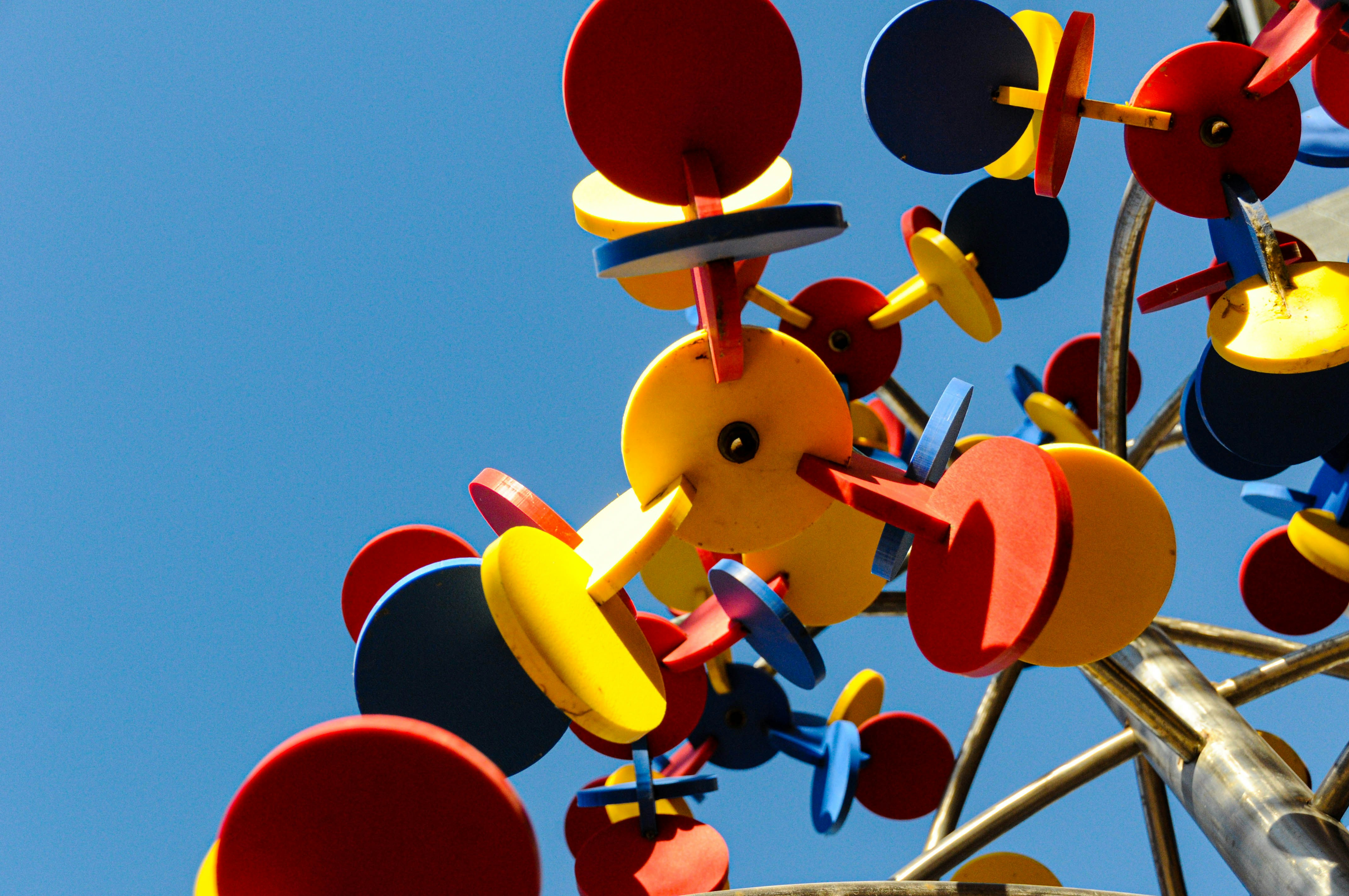Skyward Discs: A Kaleidoscopic Constellation of Painted Circles