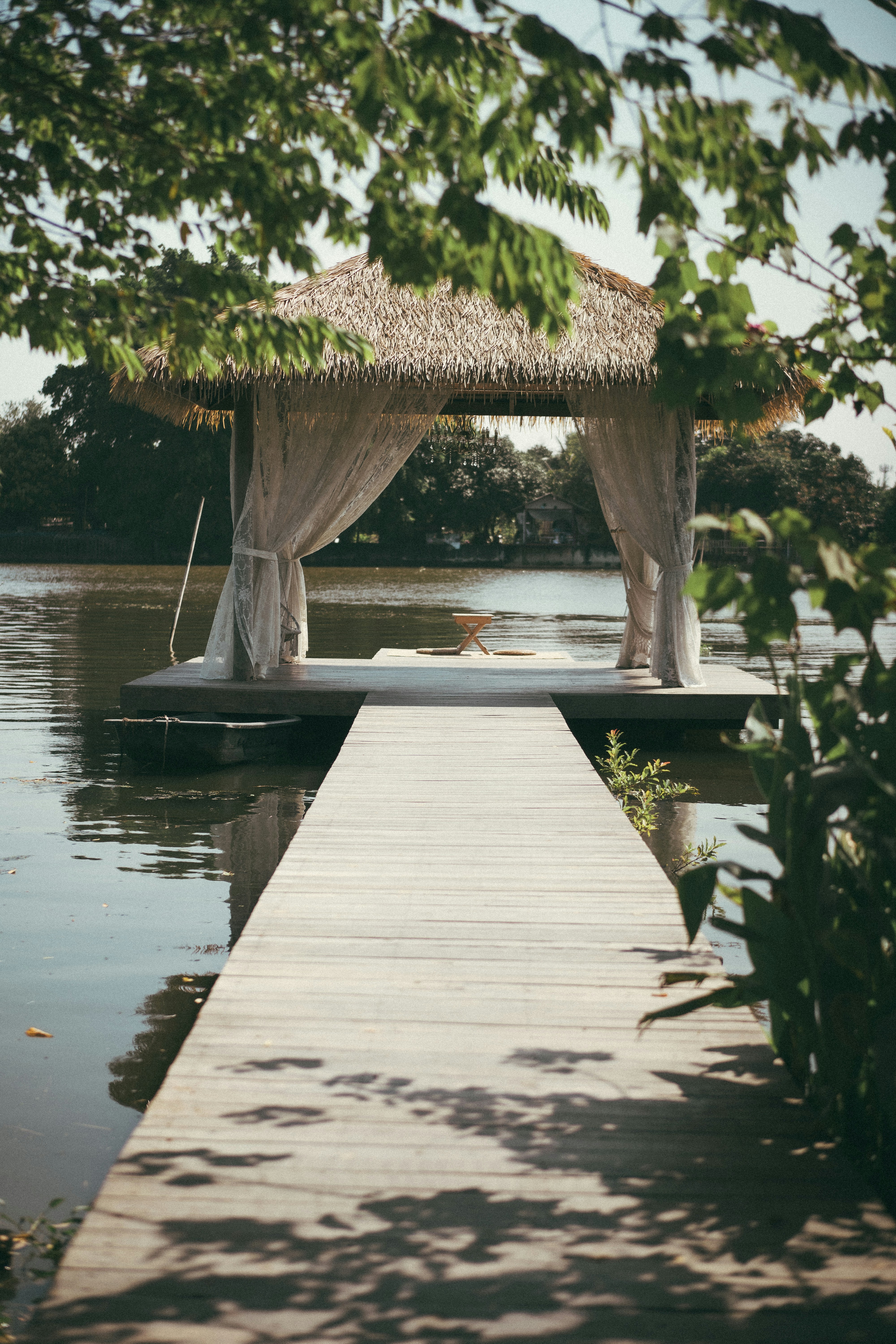 Thatched Gazebo at the End of a Quiet Dock