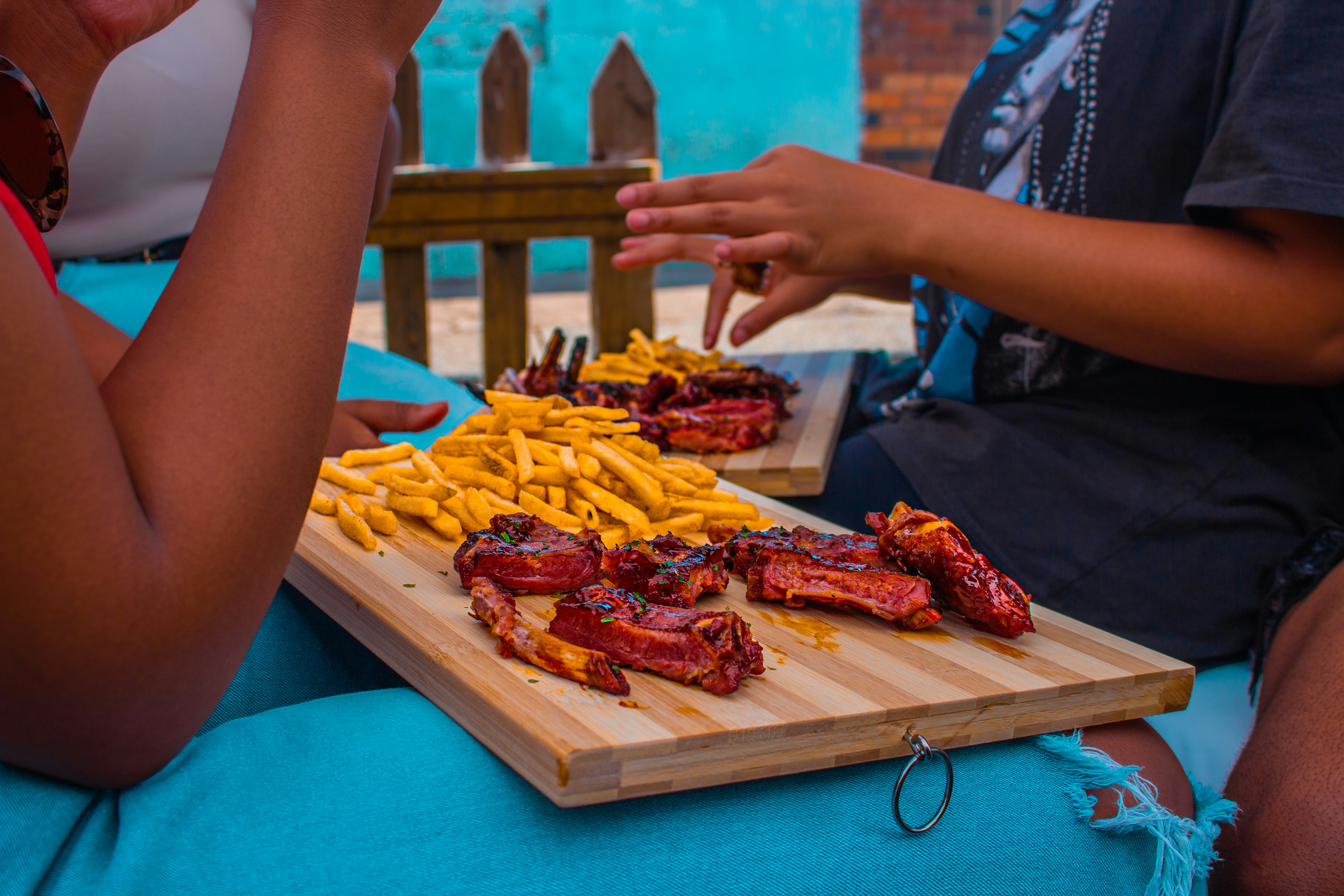 Feast on the Board: Ribs and Fry Highlight at a Casual Outdoor Meal