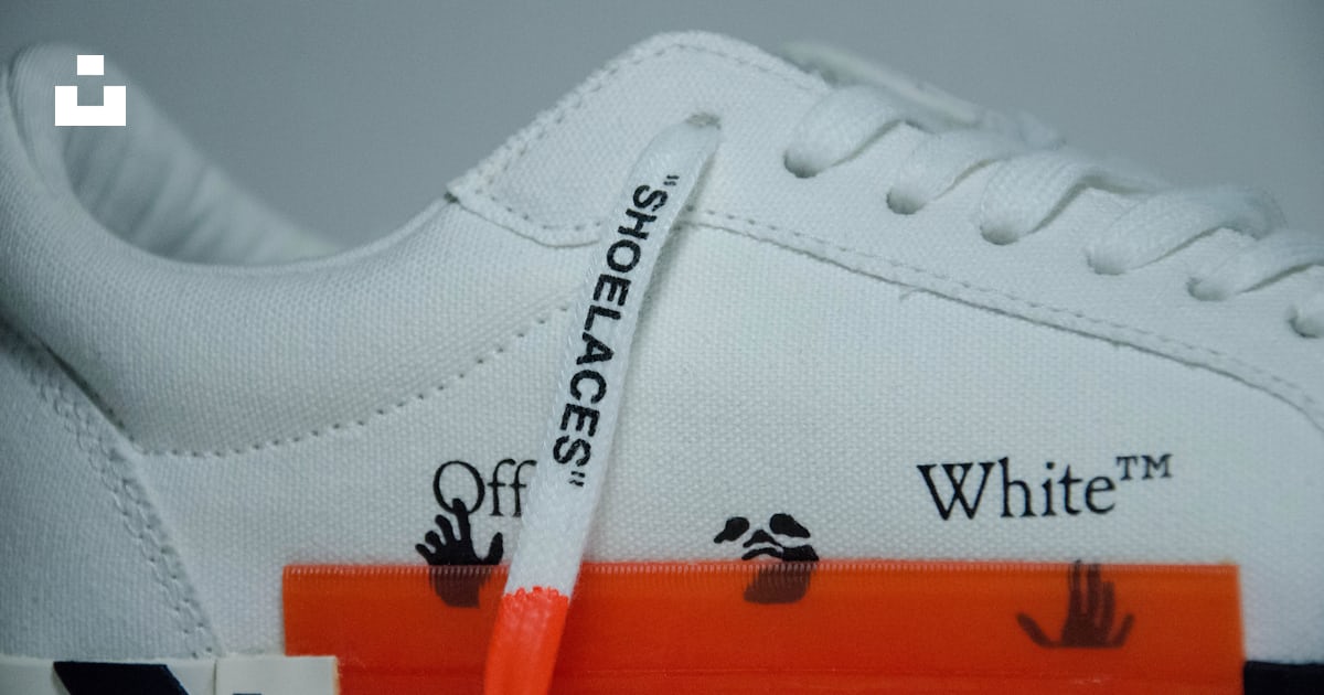White And Orange Nike Athletic Shoe Photo Free Italy Image On Unsplash