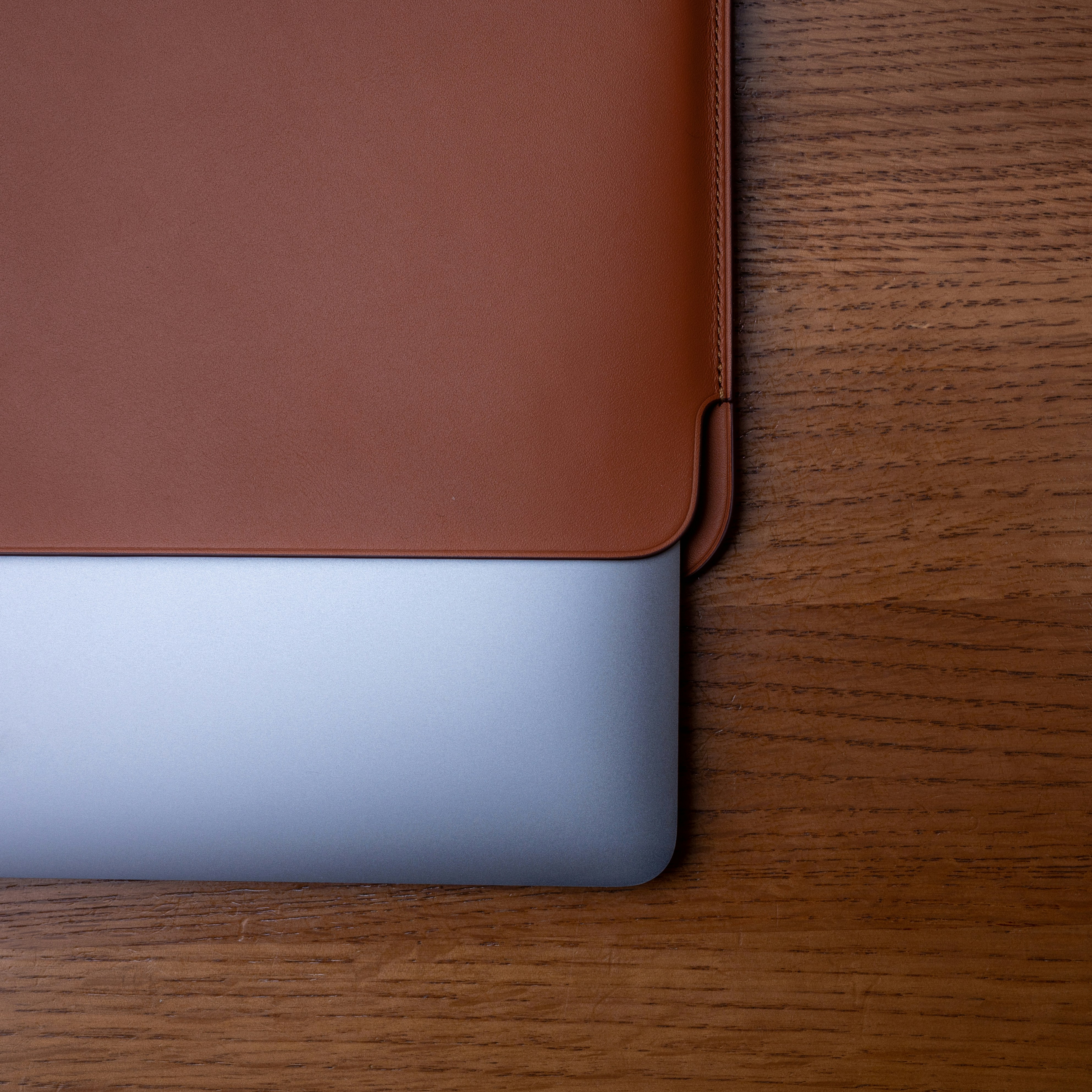 Edge Meet: Leather-Wrapped Corners on a Wood Desk