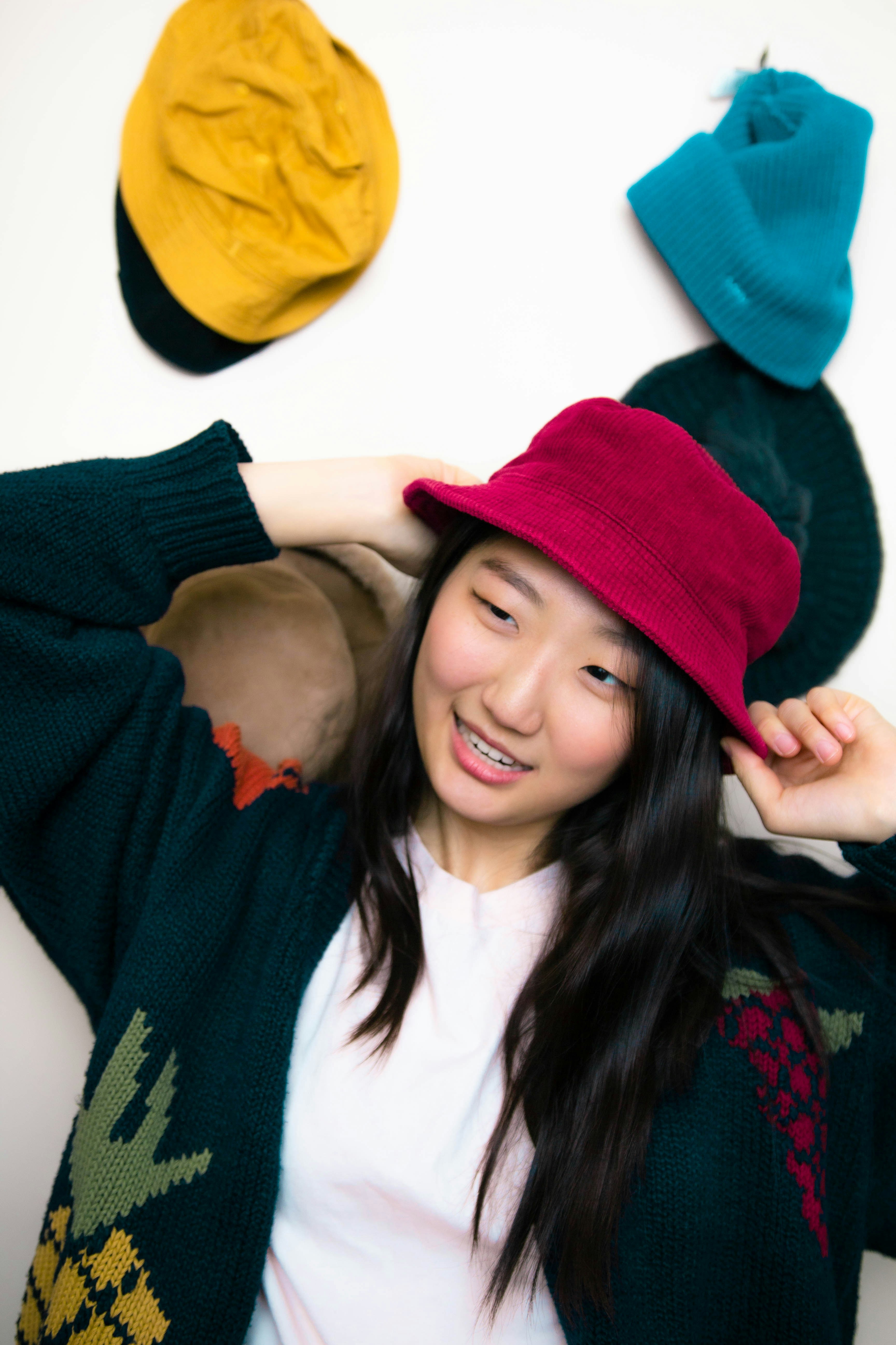 Red Hat Contours: A Lively Portrait with Colorful Hats