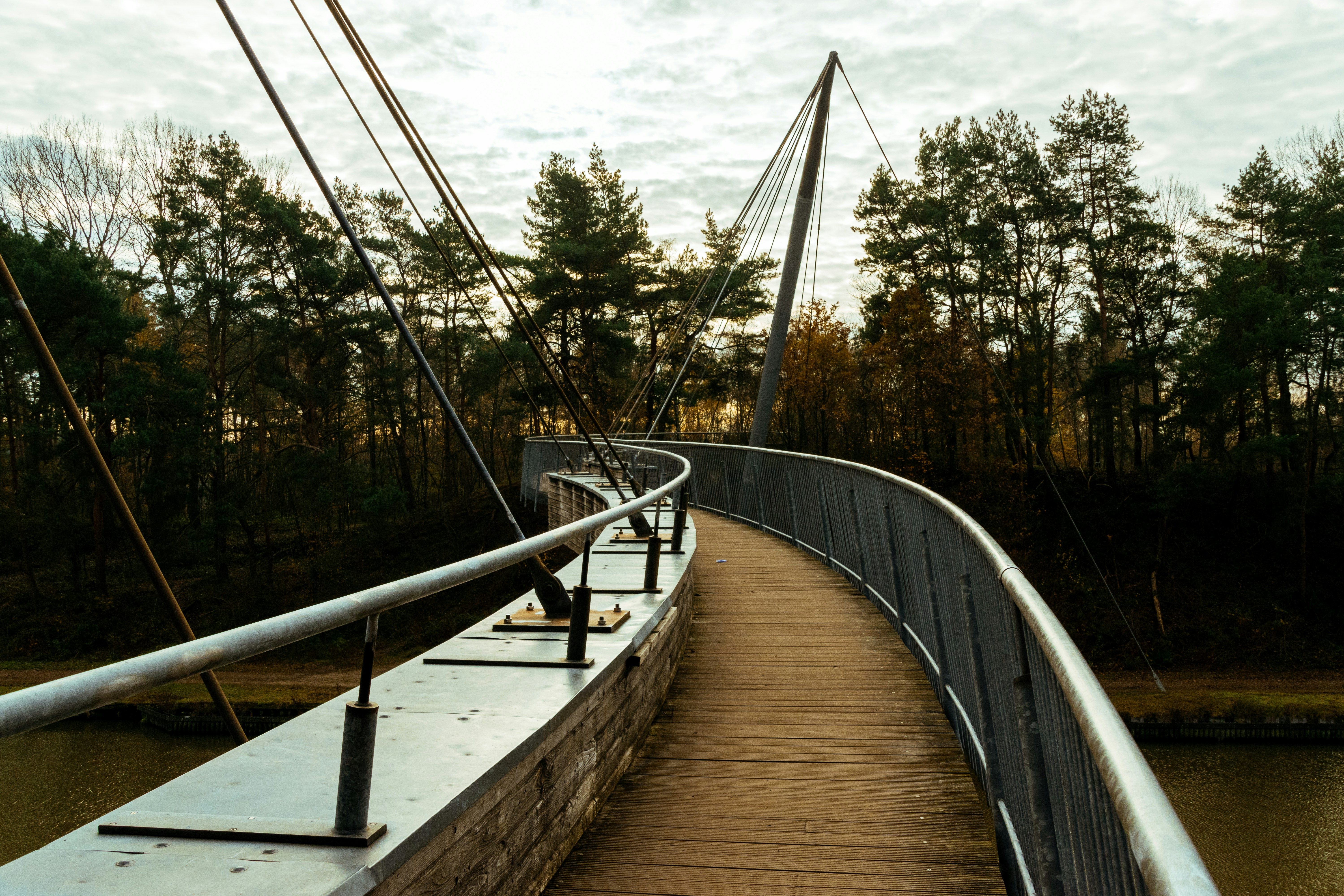a wooden bridge over a body of water