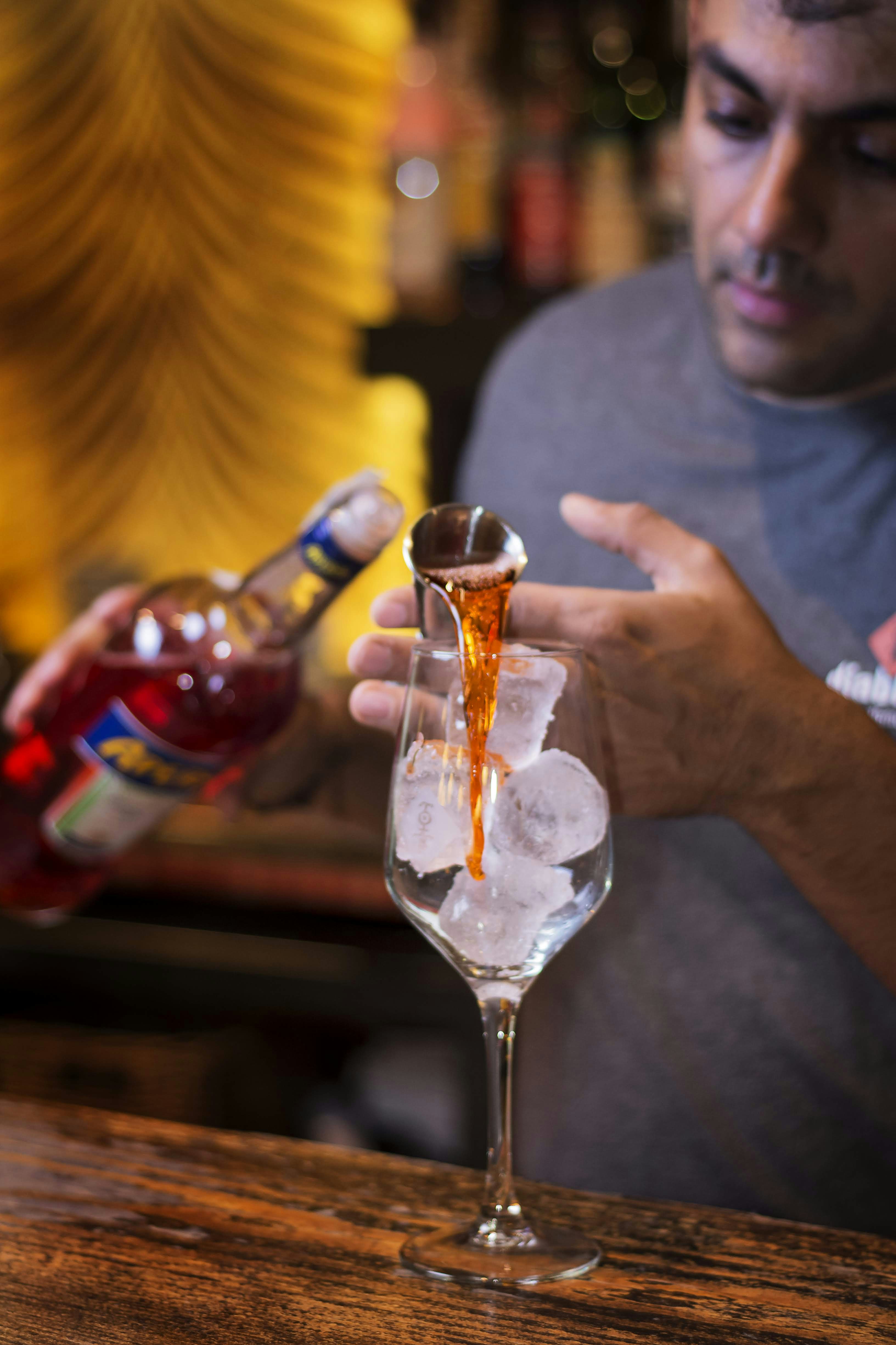 Copper Stream: Pour-over Focus in a Bar Scene