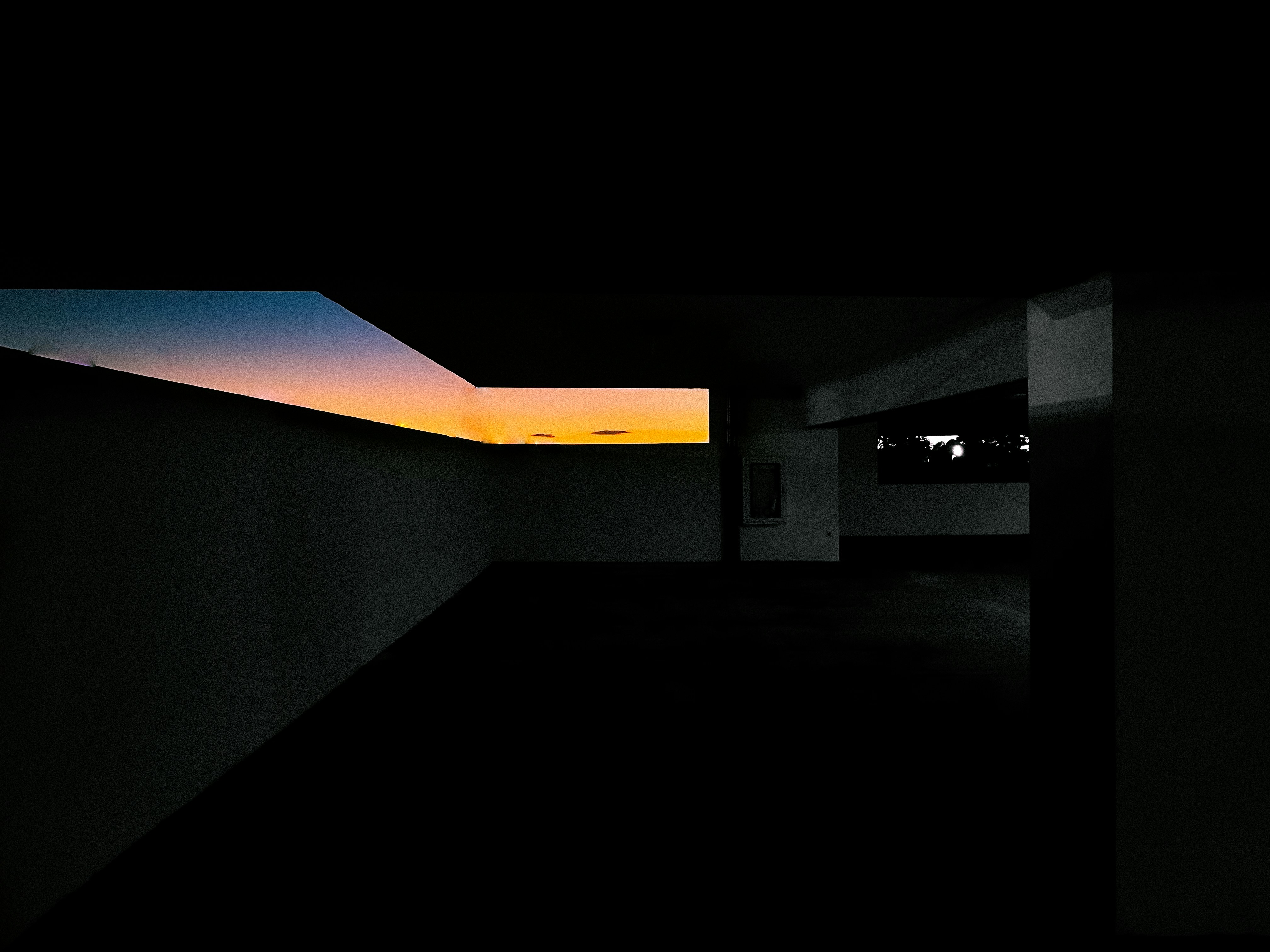 Sunset Slice in a Silent Concrete Corridor