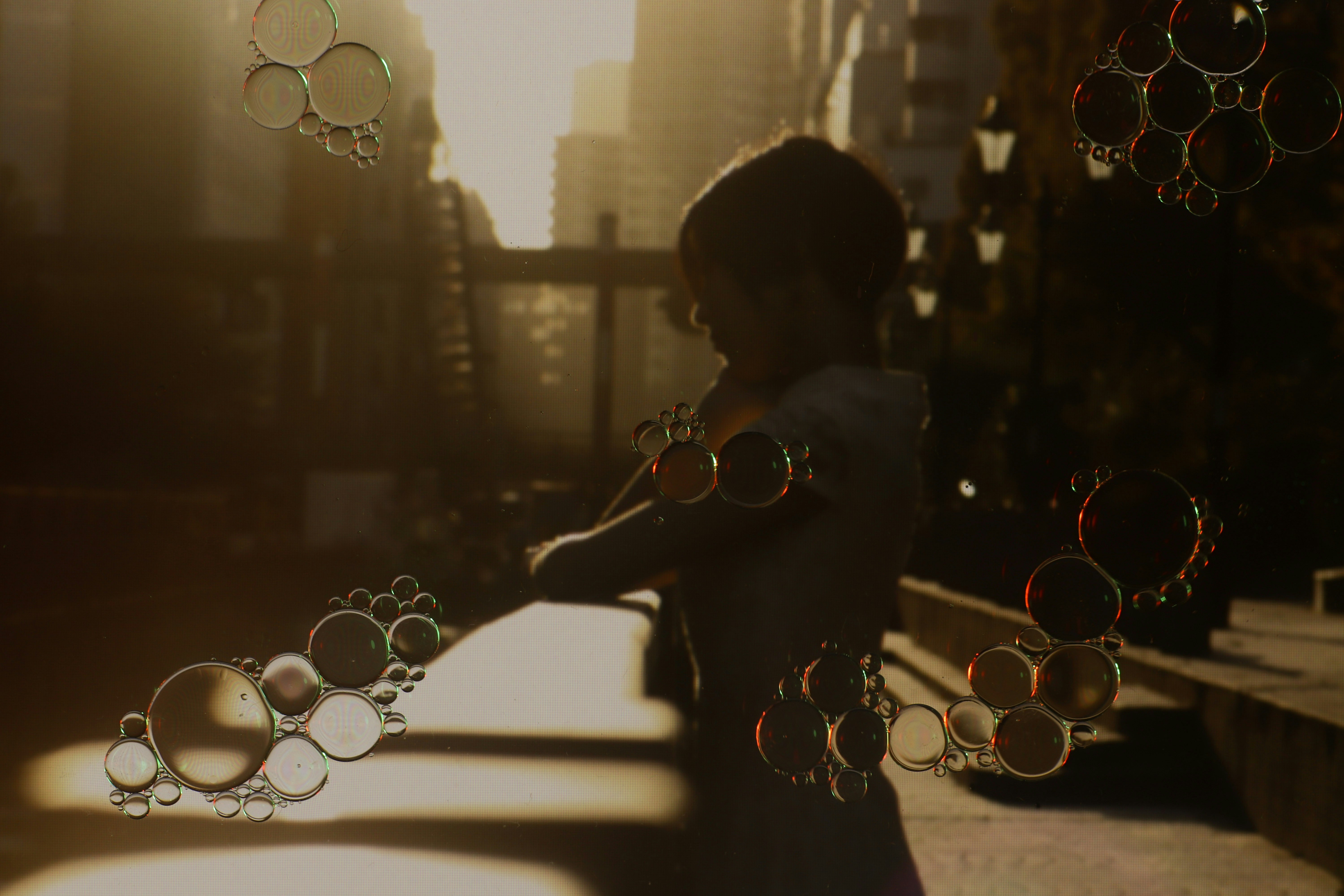 Urban Silhouette with Ethereal Bubbles