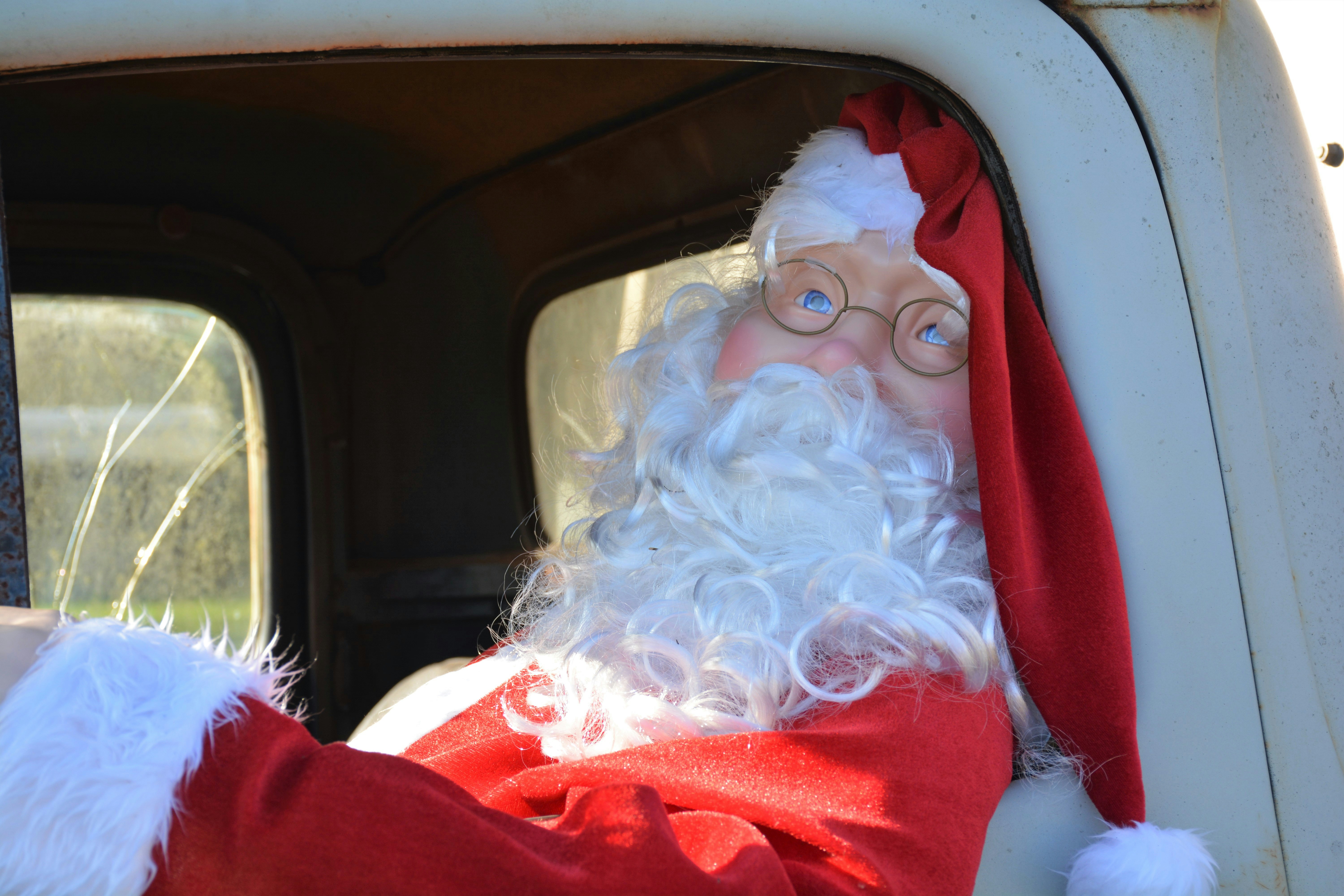 Santa in the Cab: A Rustic Christmas Moment Behind the Window