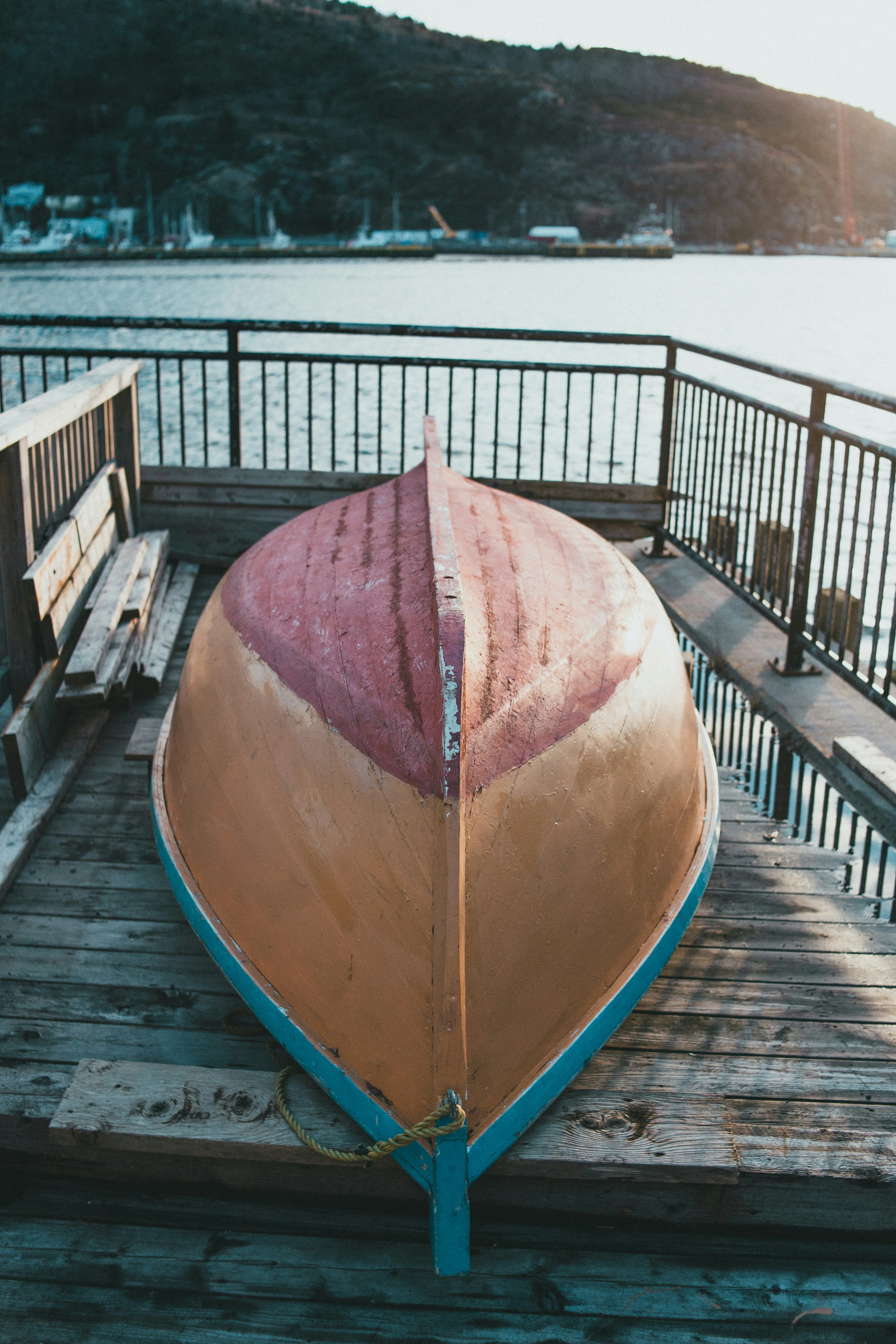 Sun-Worn Bow on a Dock: A Harbor's Quiet Dusk