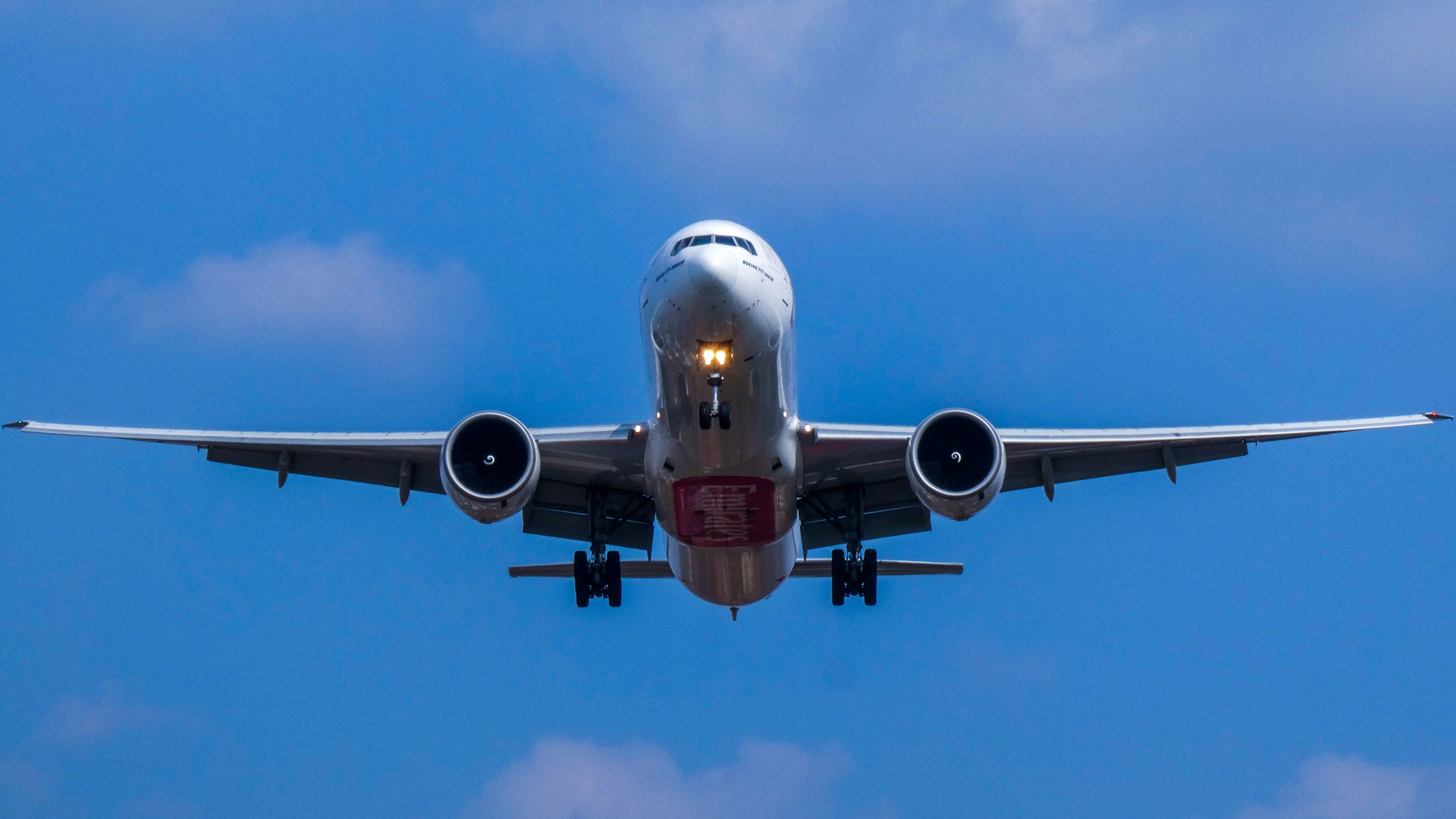 White and blue airplane under blue sky during daytime photo – Free ...