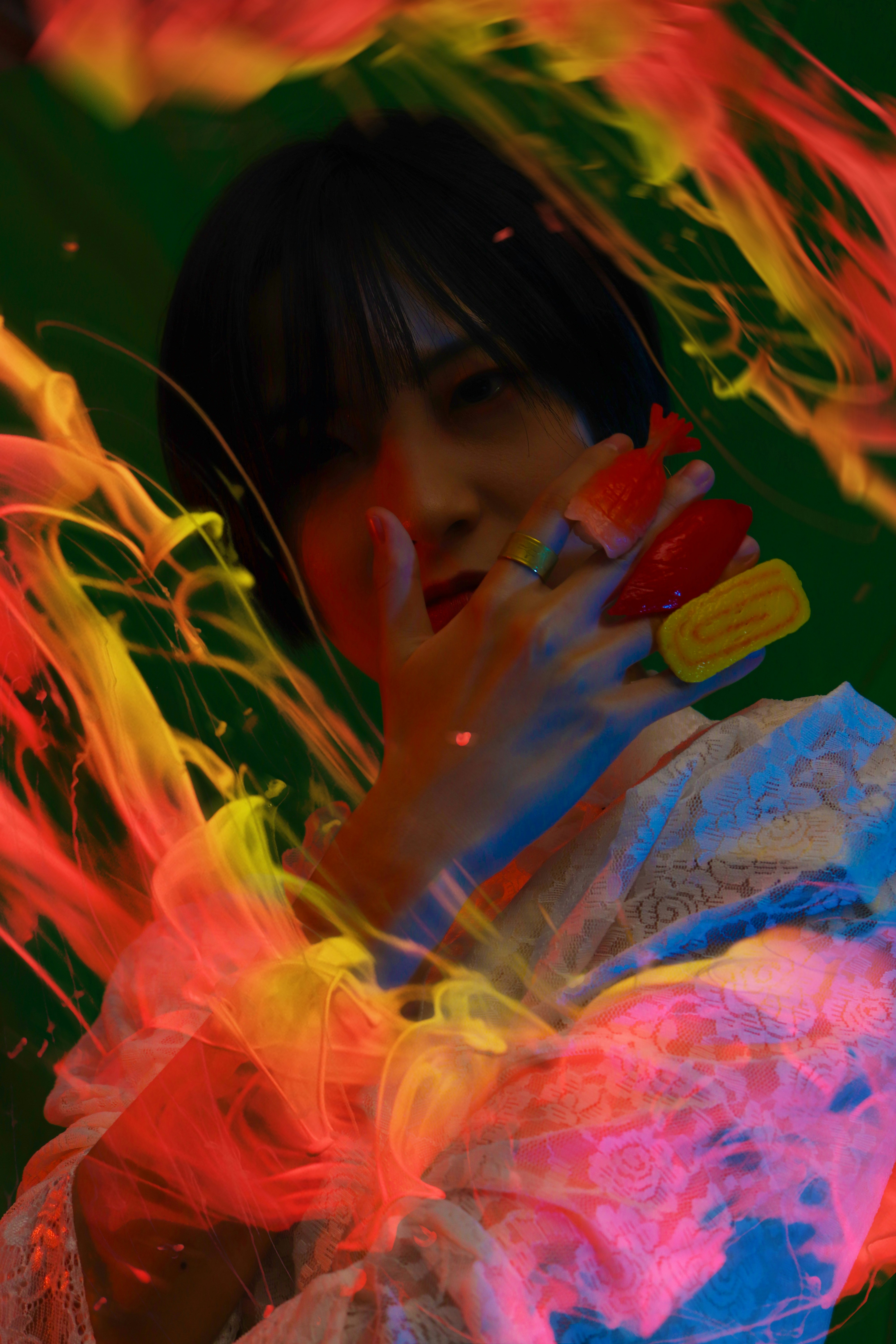 Neon Ribbon Portrait: A Quiet Moment Wrapped in Color Trails