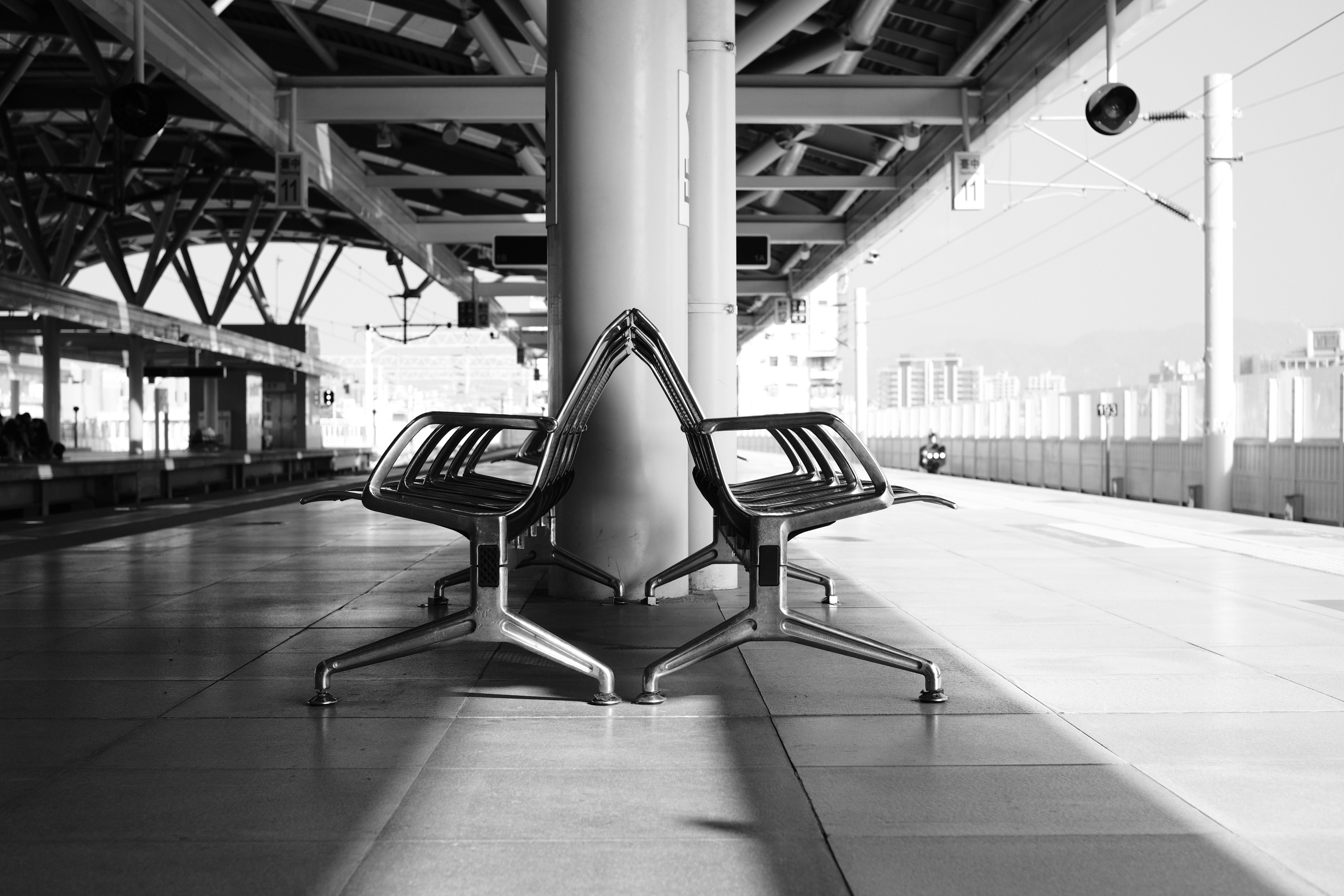 Symmetry at the Station: A Central Bench under the Arrivals Hall