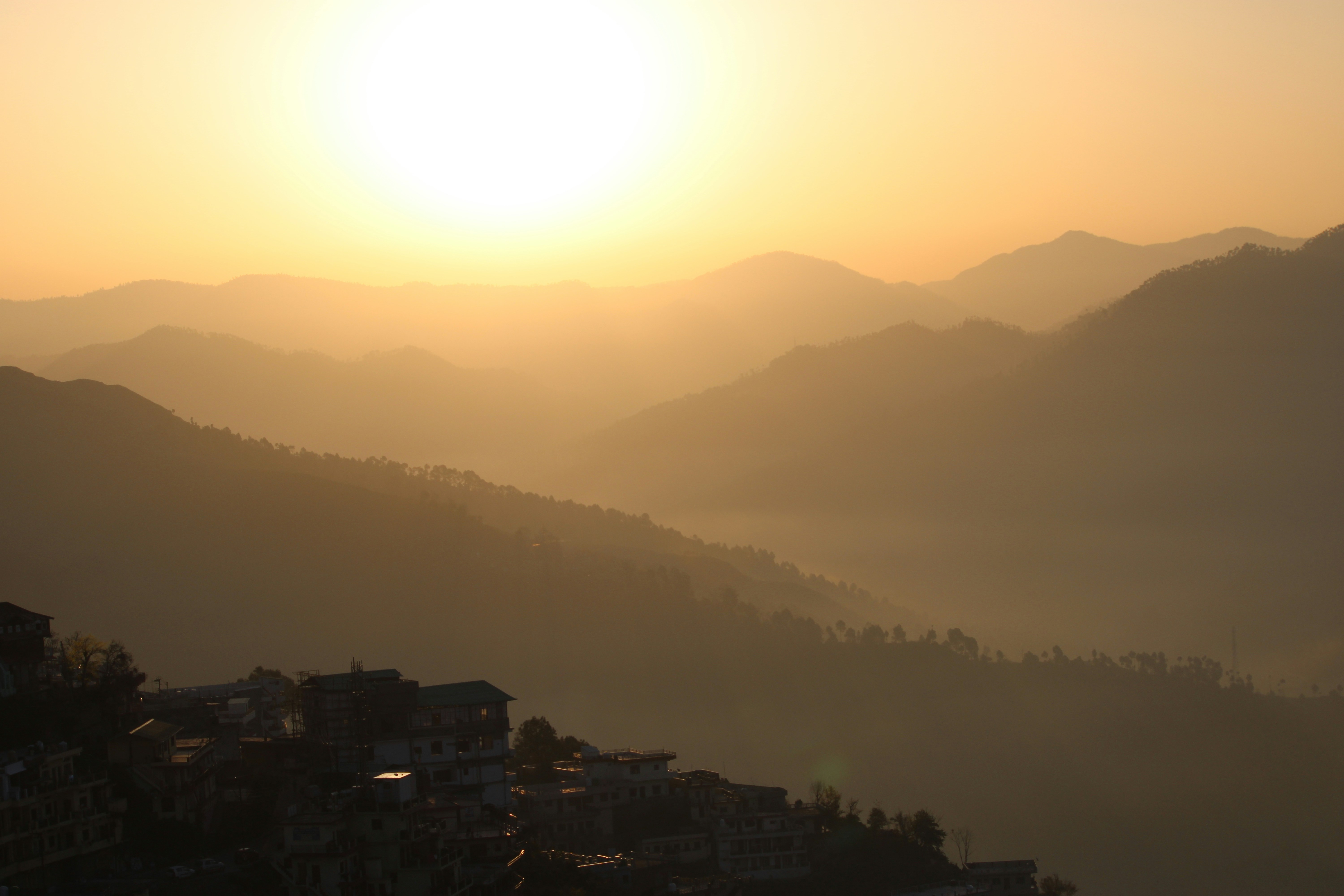City buildings under white sky during daytime photo – Free Almora Image ...