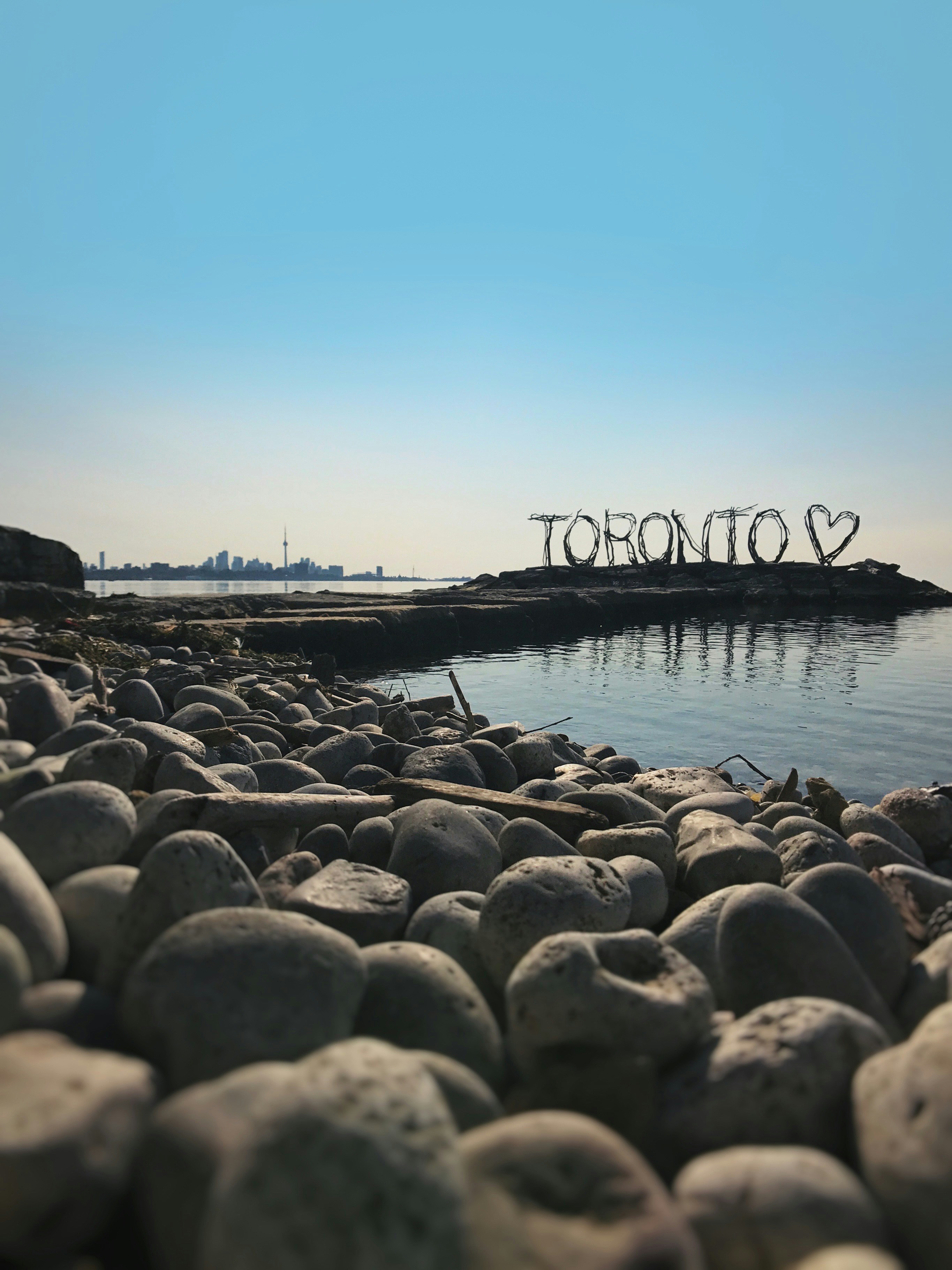 Toronto Letters on a Pebble Pier: Quiet Waterfront Signage by the Lake