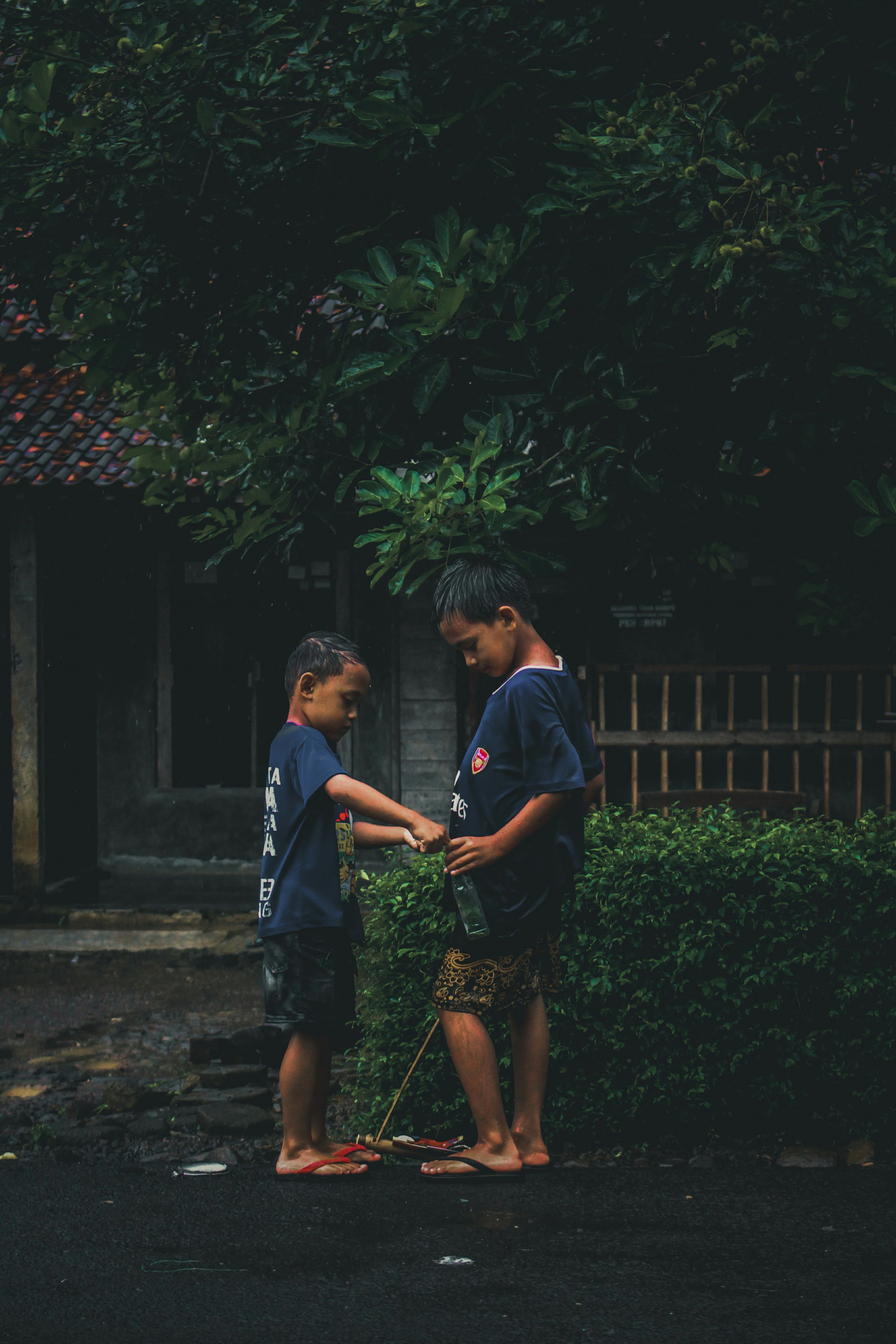 Damp Street Exchange: Two Boys in a Quiet Yard