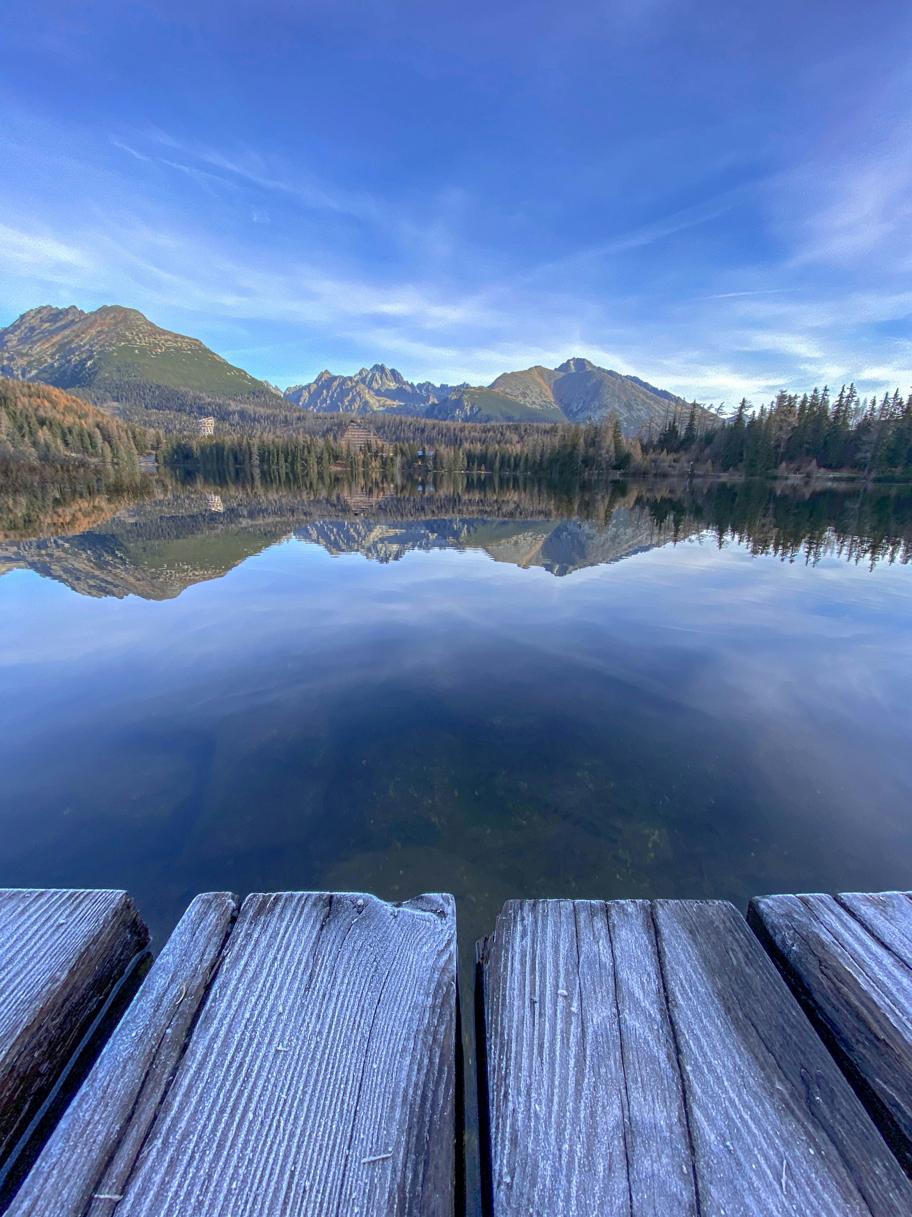 Brown wooden dock on lake during daytime photo – Free Blue Image on ...