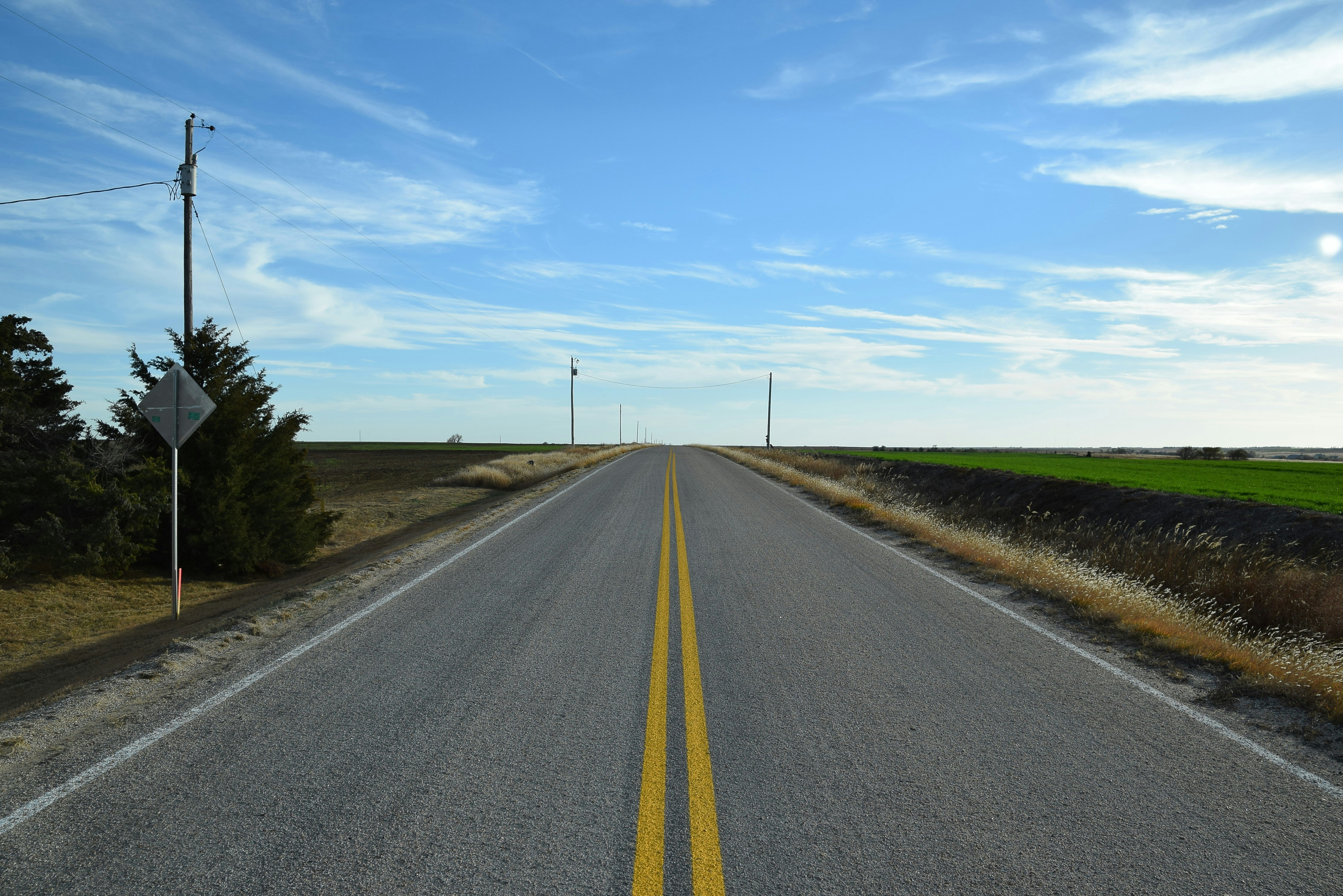 Gray concrete road under blue sky during daytime photo – Free Blue ...