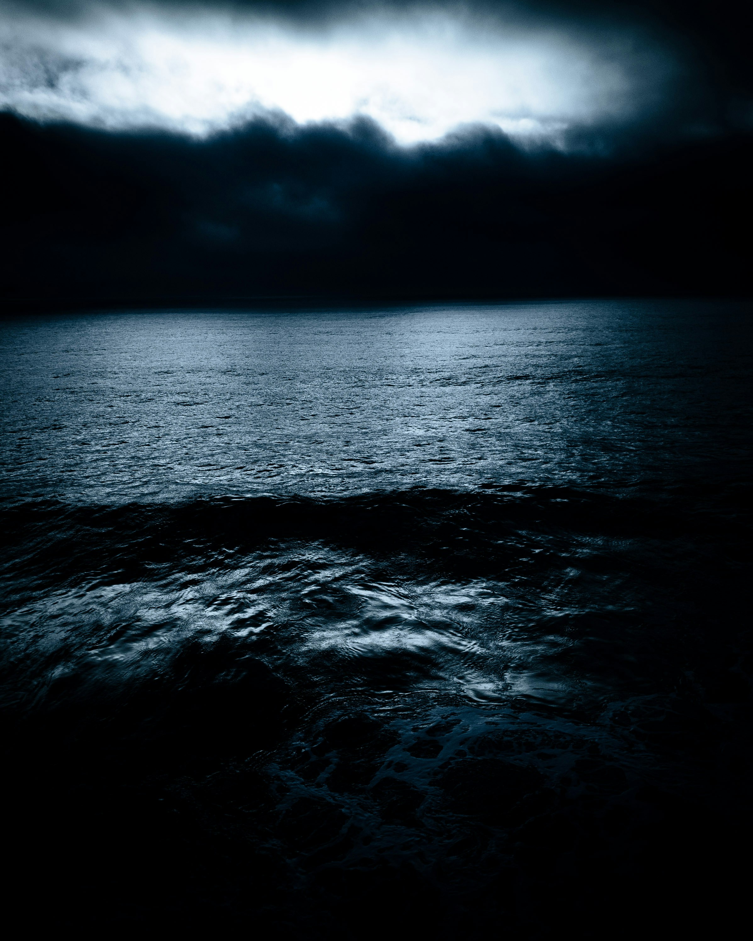 Midnight Sea: A Silent Horizon Under Storm Clouds