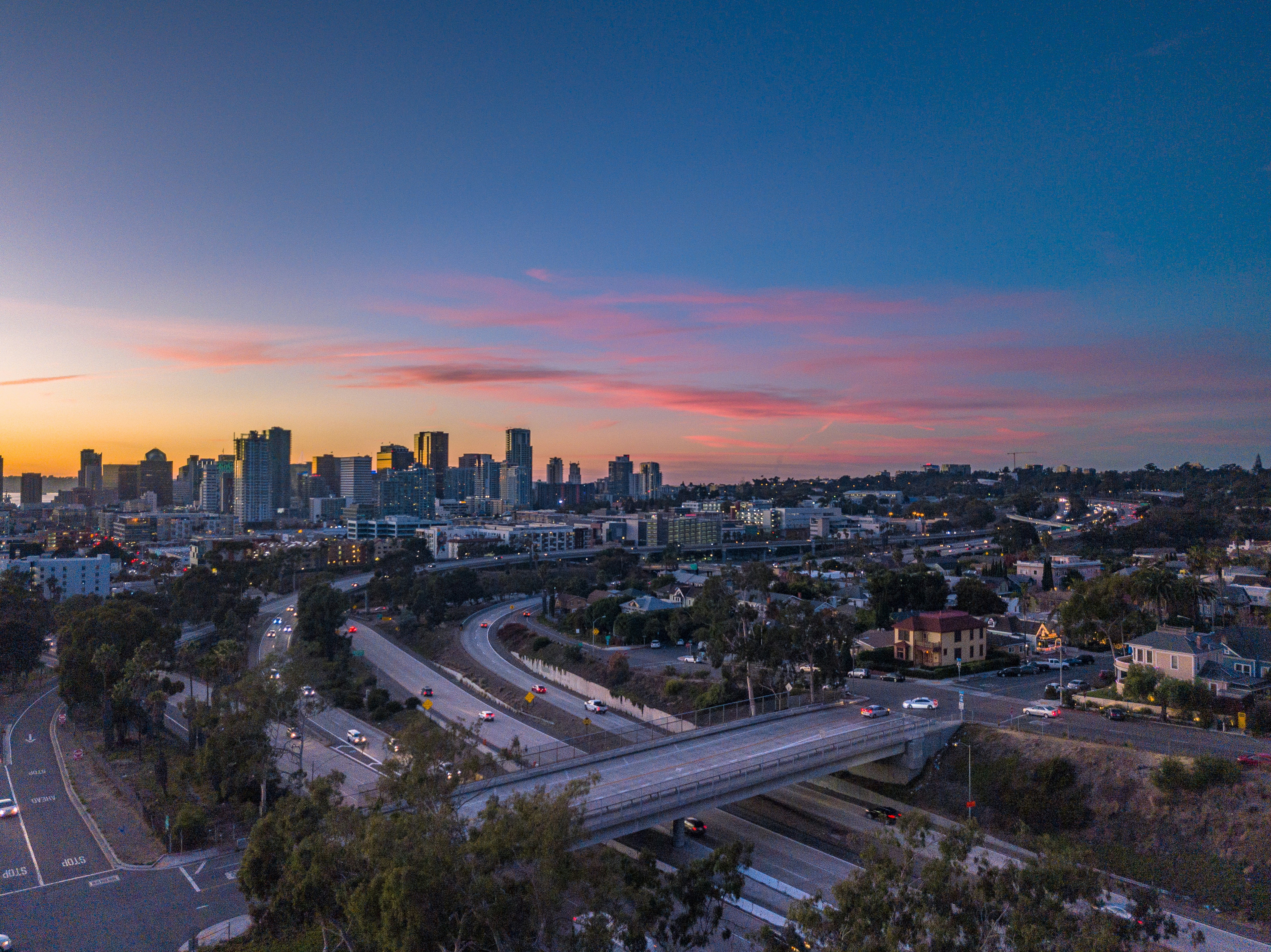 Sunset Skyline Over Suburban Sprawl