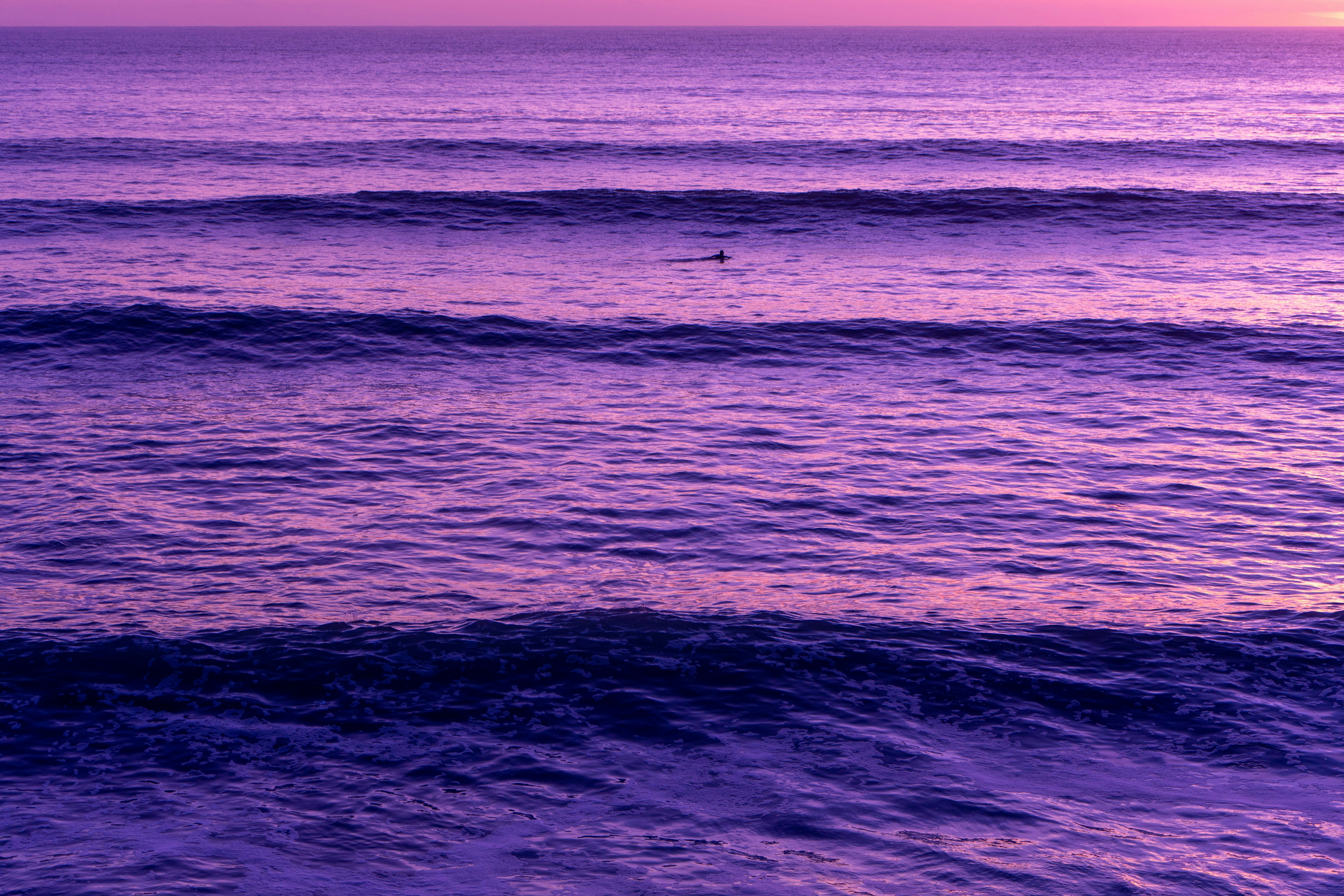 Lavender Horizon: Quiet Dusk Waves in a Neon Purple Sea