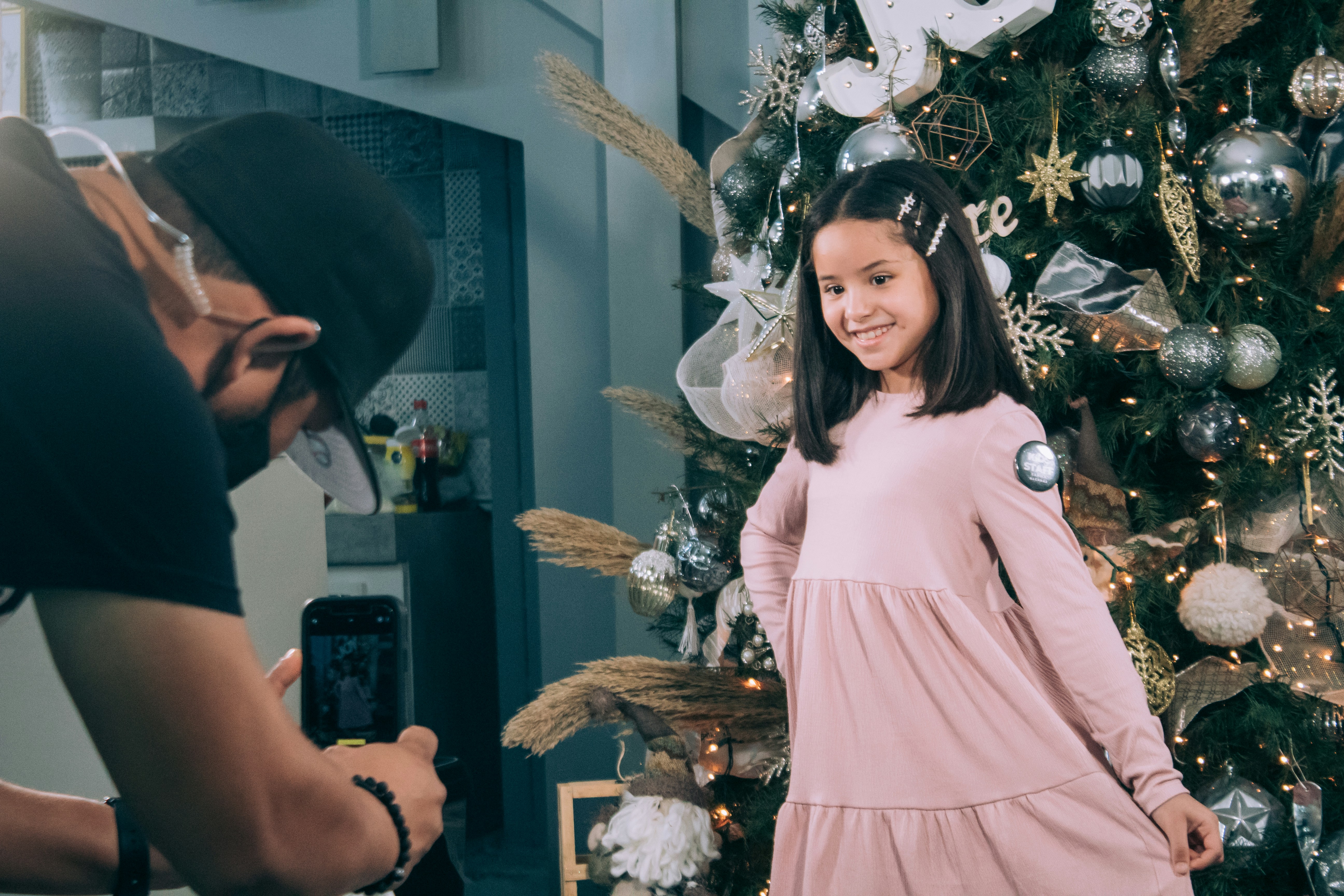 Pink Dress, Christmas Glow: A Portrait by the Tree