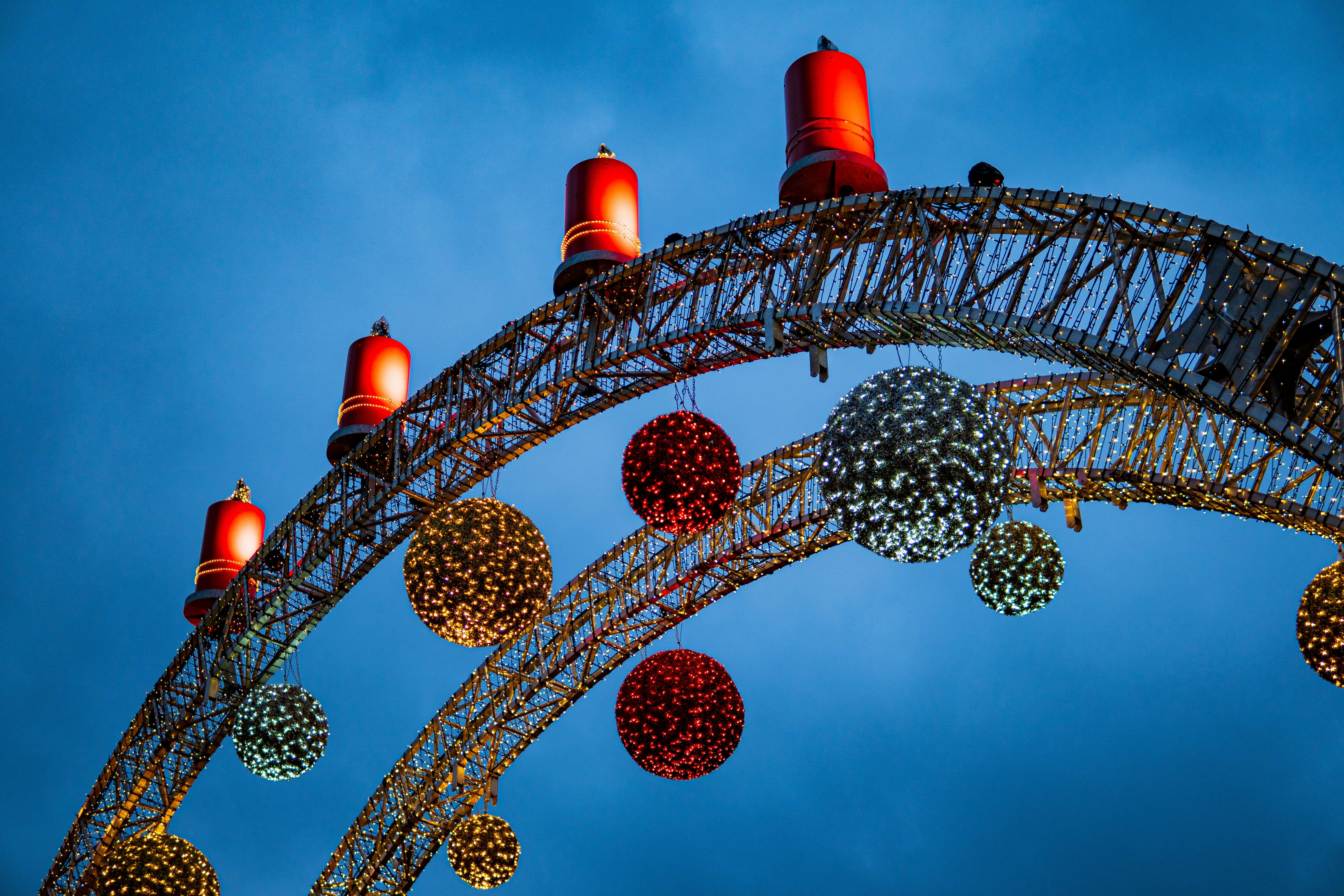 Twilight Archway: a chorus of glowing orbs and crimson lanterns